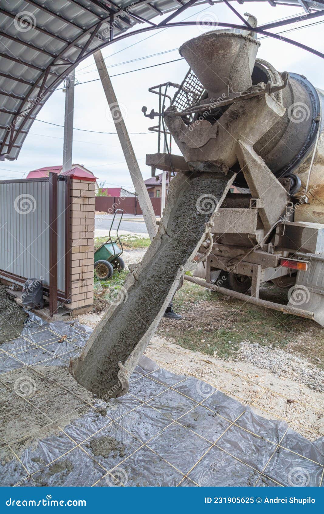The Machine is Pouring Concrete Mix at a Construction Site. Stock Image ...