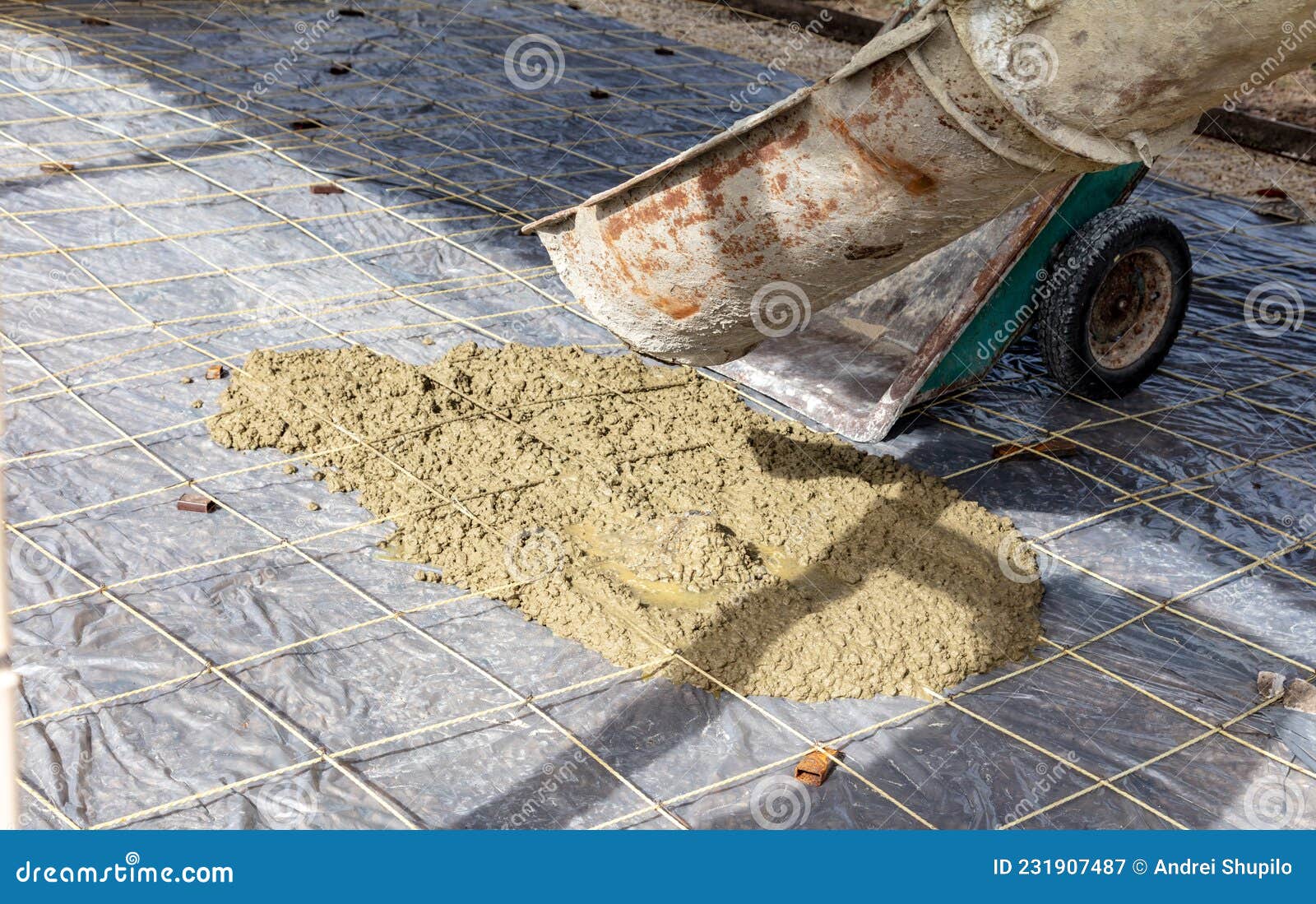 The Machine is Pouring Concrete Mix at a Construction Site. Stock Image ...