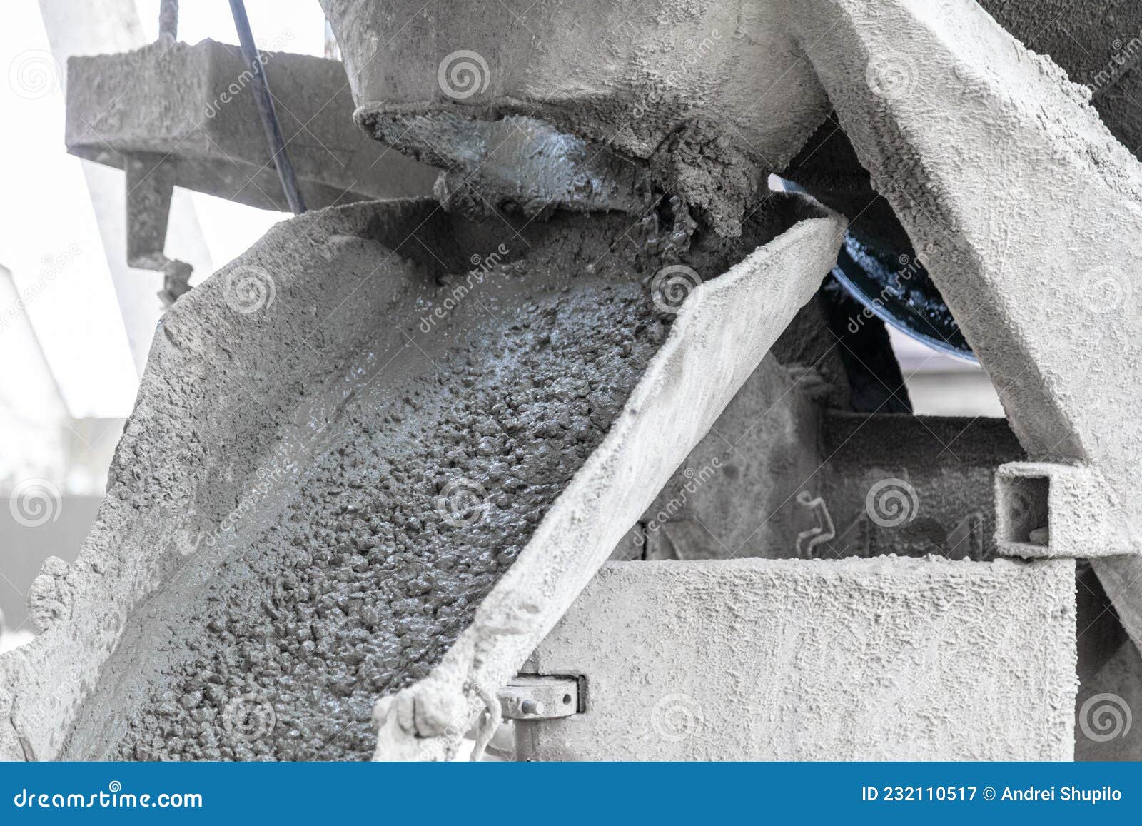 The Machine is Pouring Concrete Mix at a Construction Site. Stock Image ...