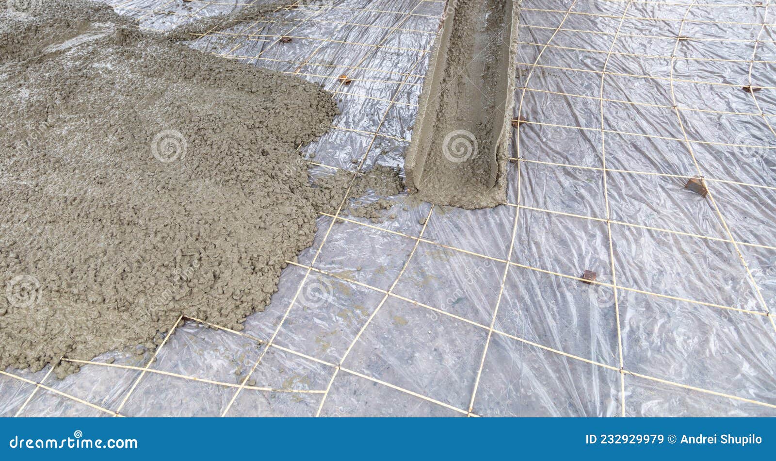 The Machine is Pouring Concrete Mix at a Construction Site. Stock Image ...