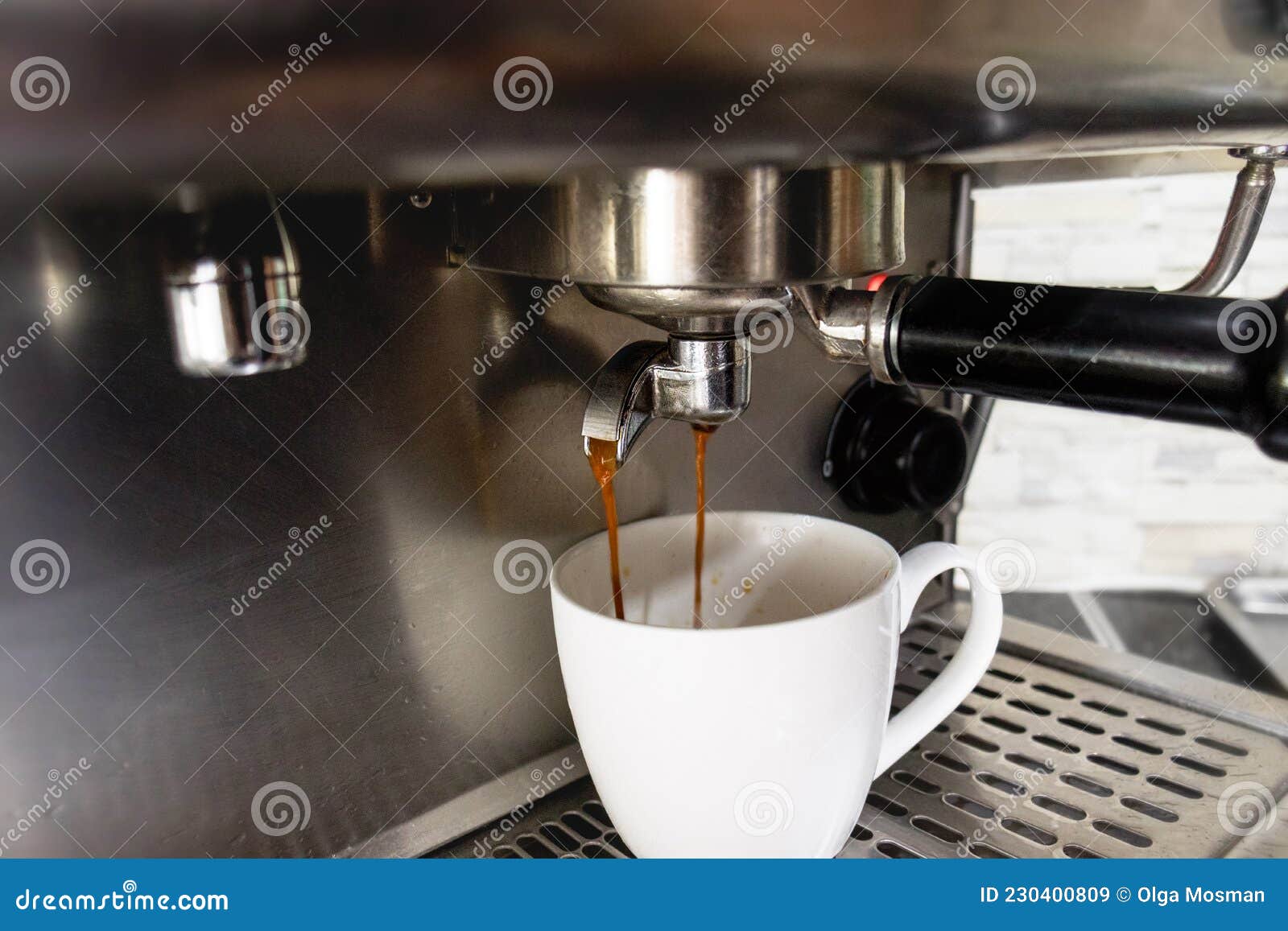 Extraction of Freshly Ground Coffee from a Professional Coffee Machine ...