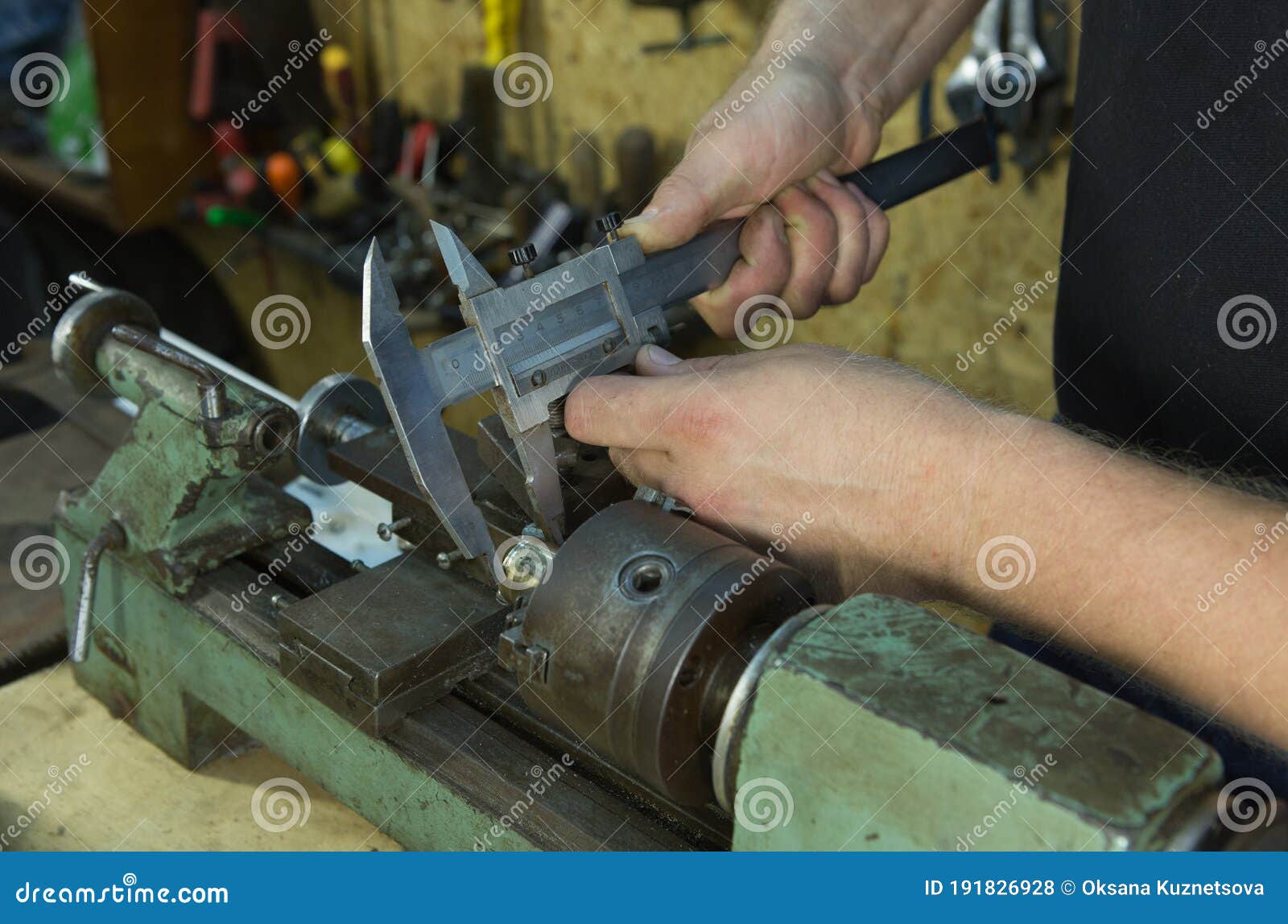 Working on a Lathe. the Machine is Ready for Work. the Wizard Checks ...