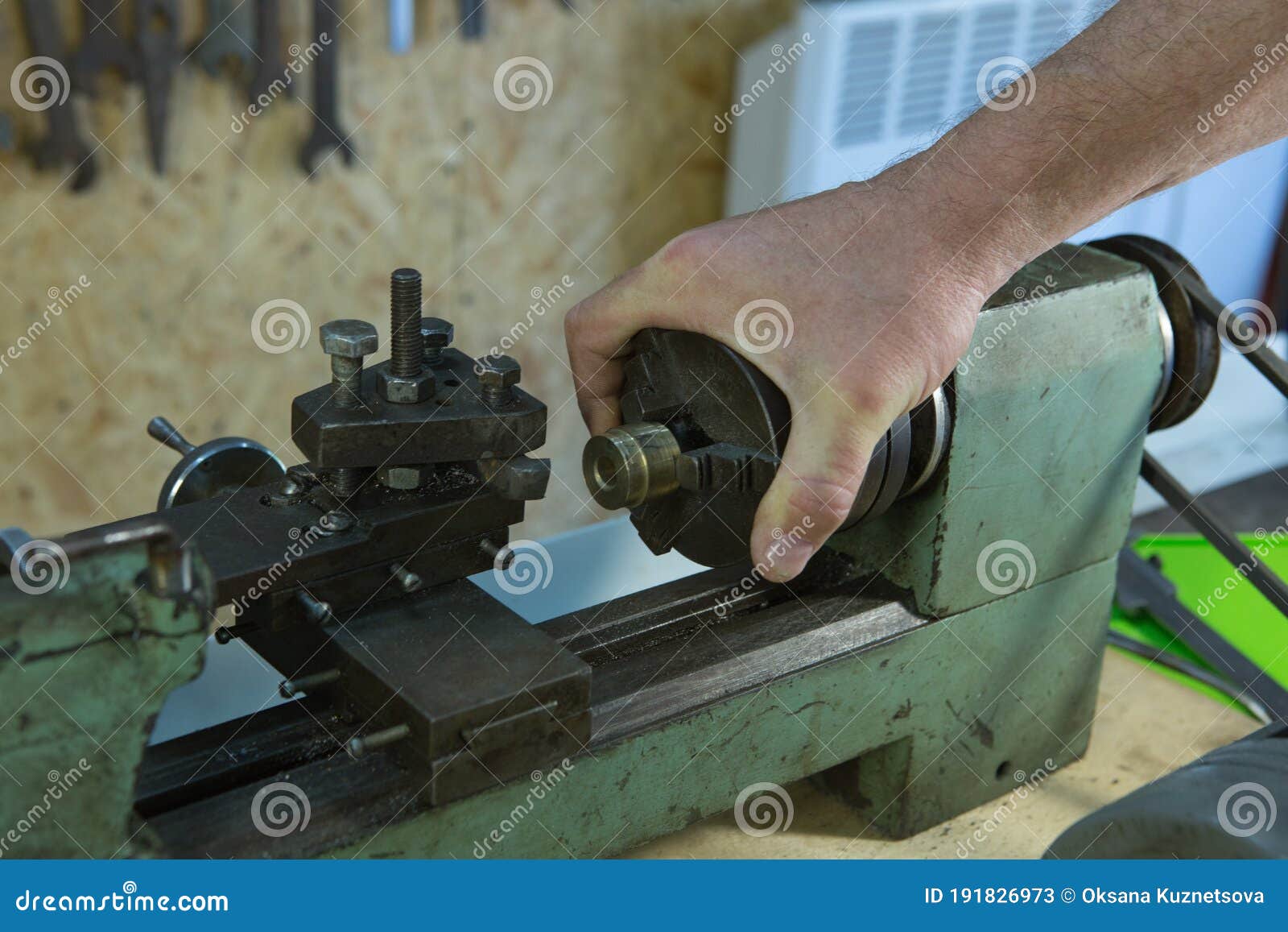 Working on a Lathe. the Machine is Ready for Work. the Wizard Checks ...