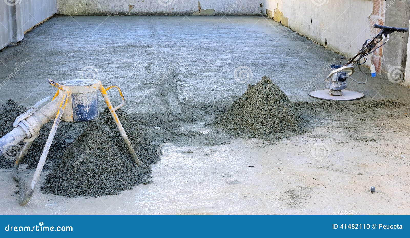 Machine Running Screed Flooring. Worker At Construction Site Sand And ...