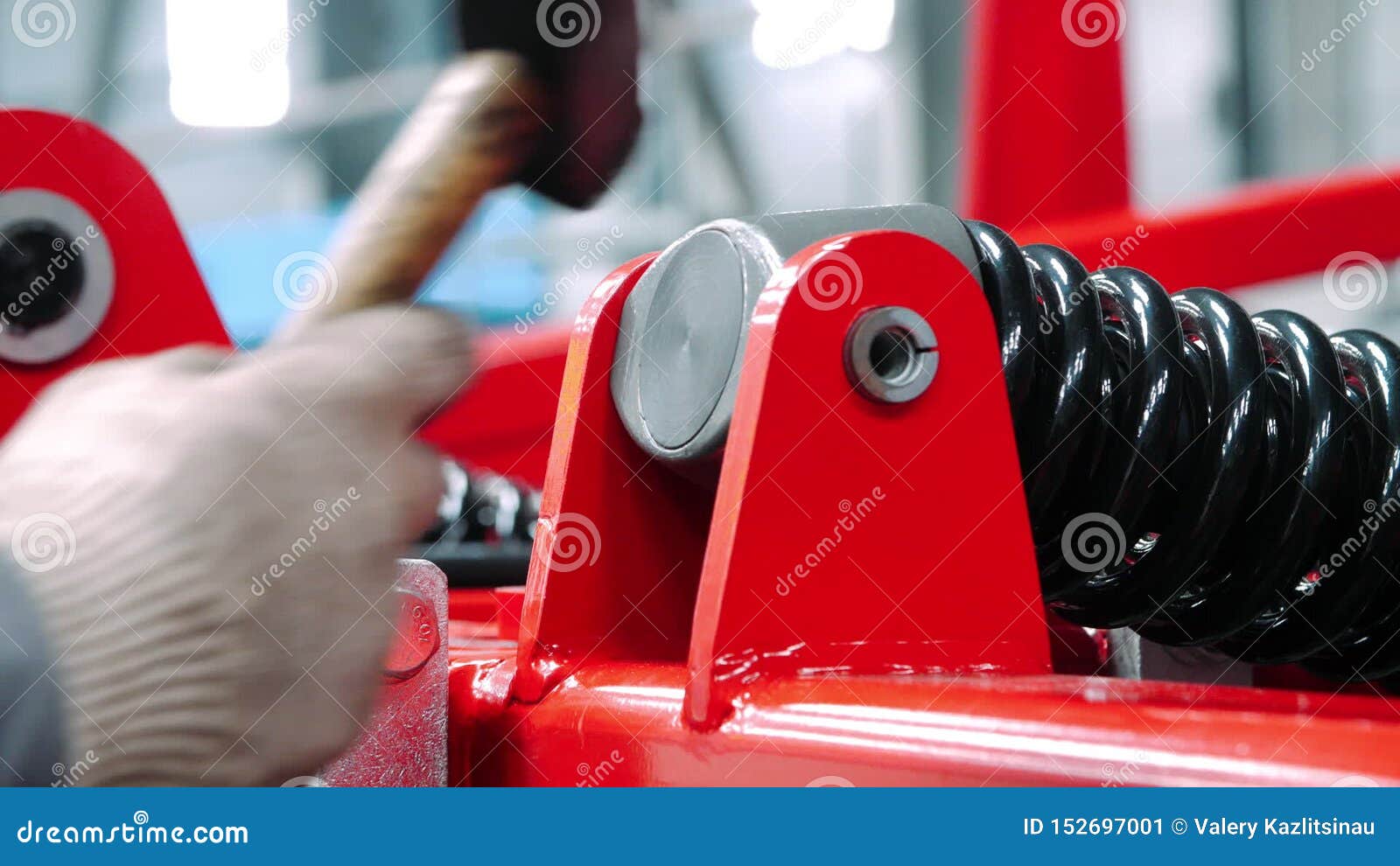 Machine Shop Worker Inserting Sleeve into Shock Absorber. Manual ...