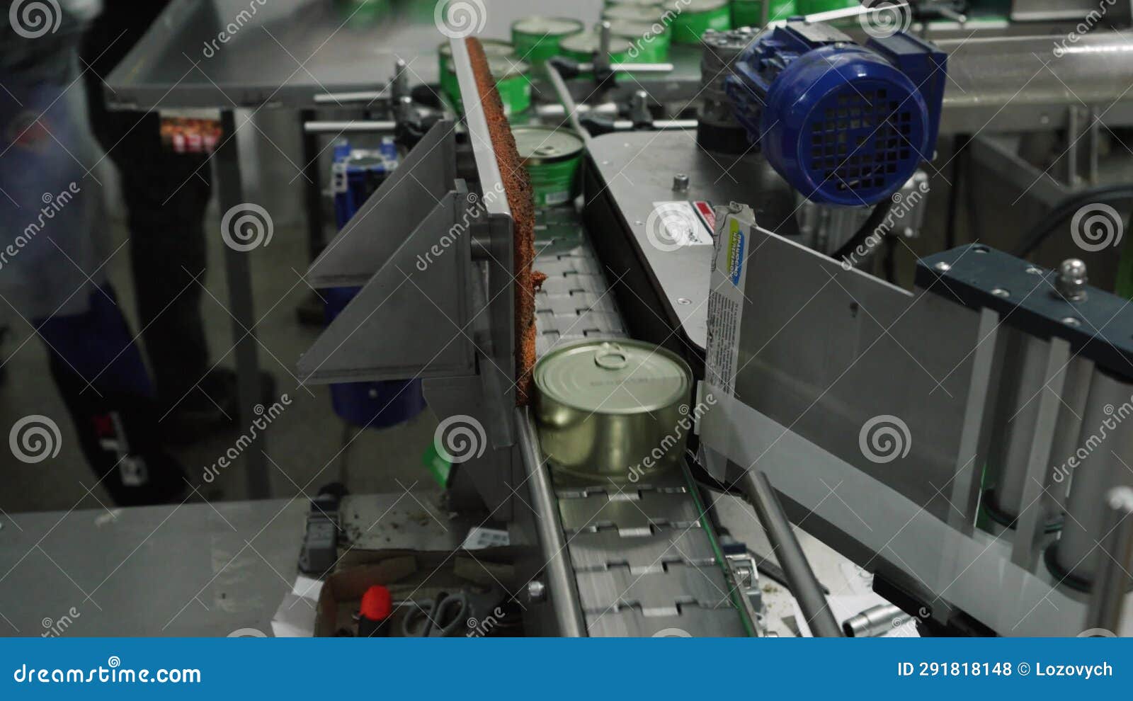 A Machine that Sticks Labels on Containers. Fresh Pork Manufacturing ...