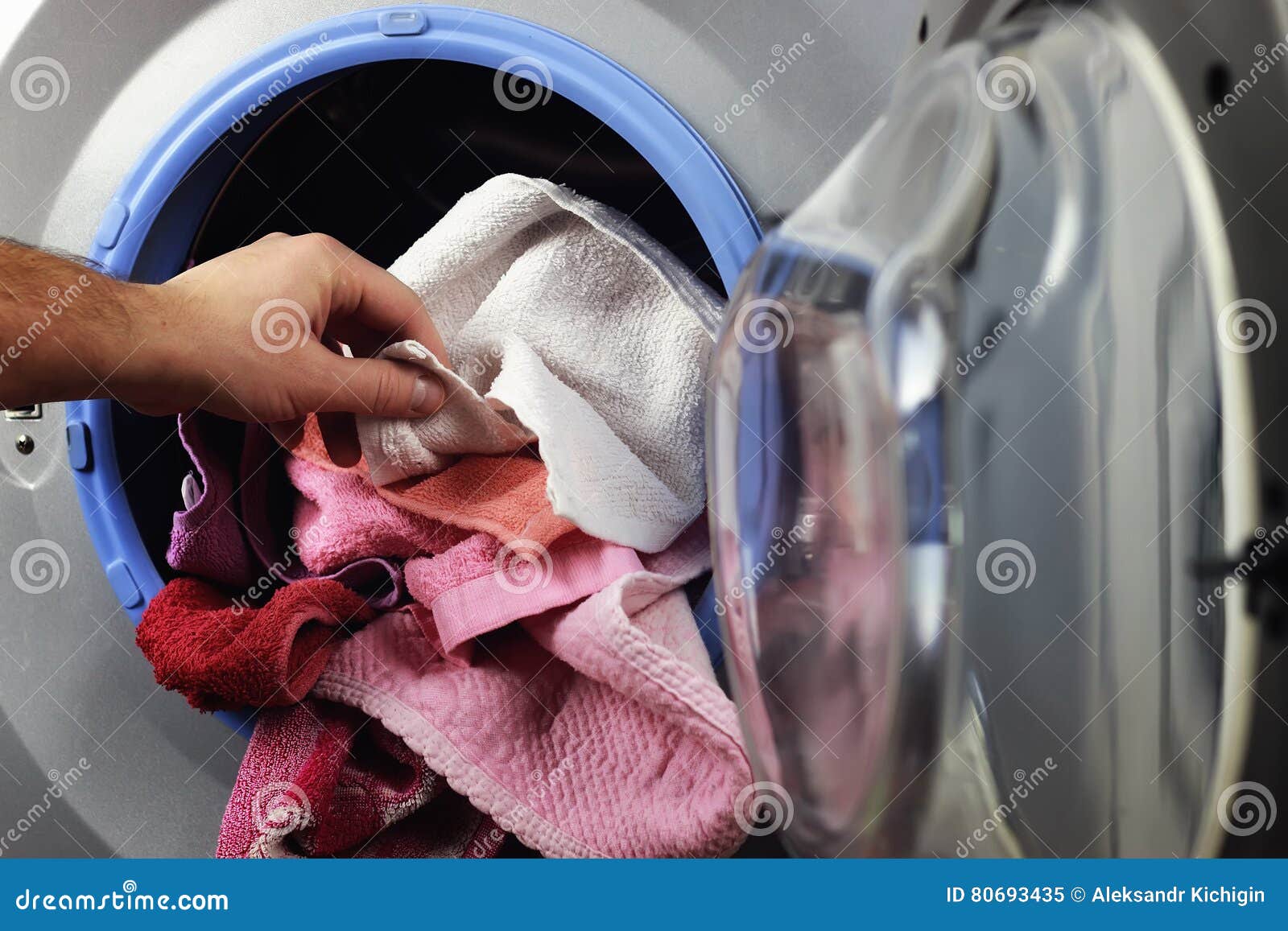 Machine Washer hand put stock image. Image of dirty, colorful - 80693435