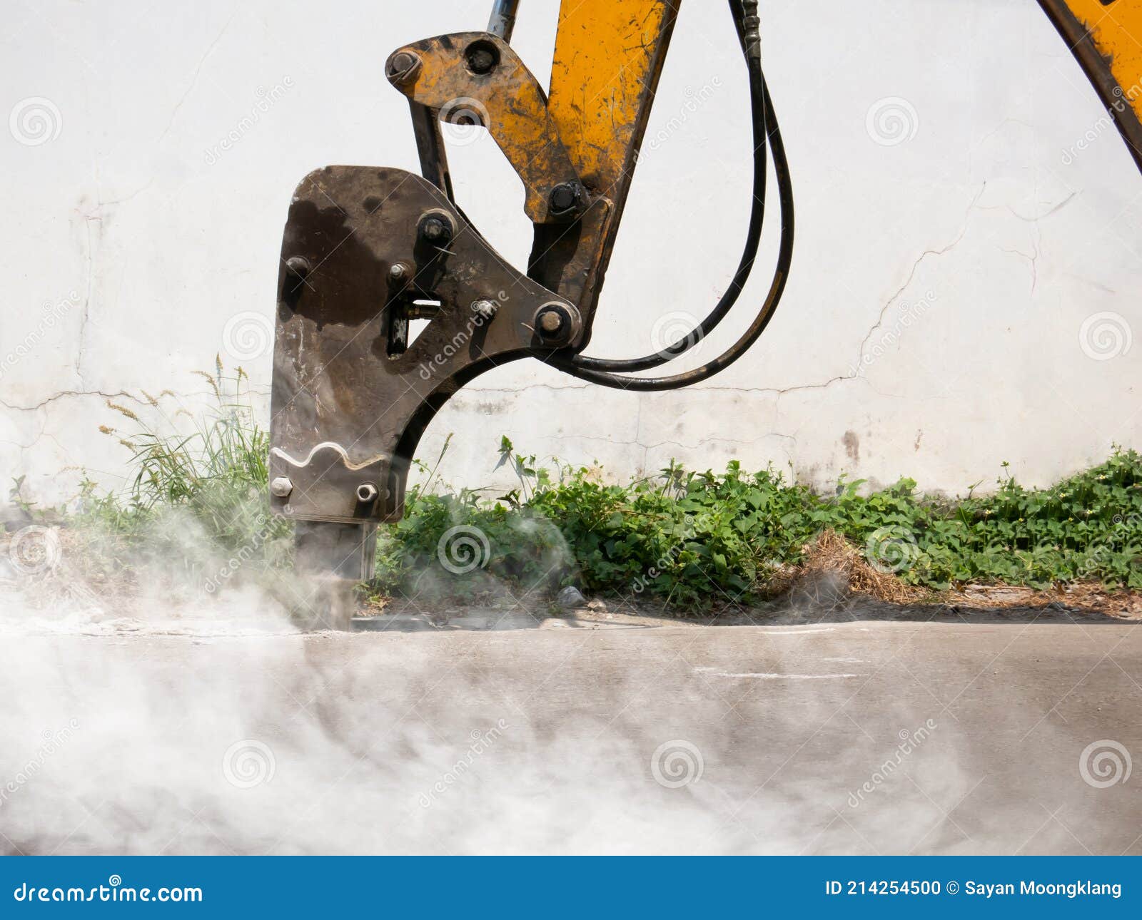 Machine is Working To Drill the Concrete Pavement Causing Dust Smoke ...