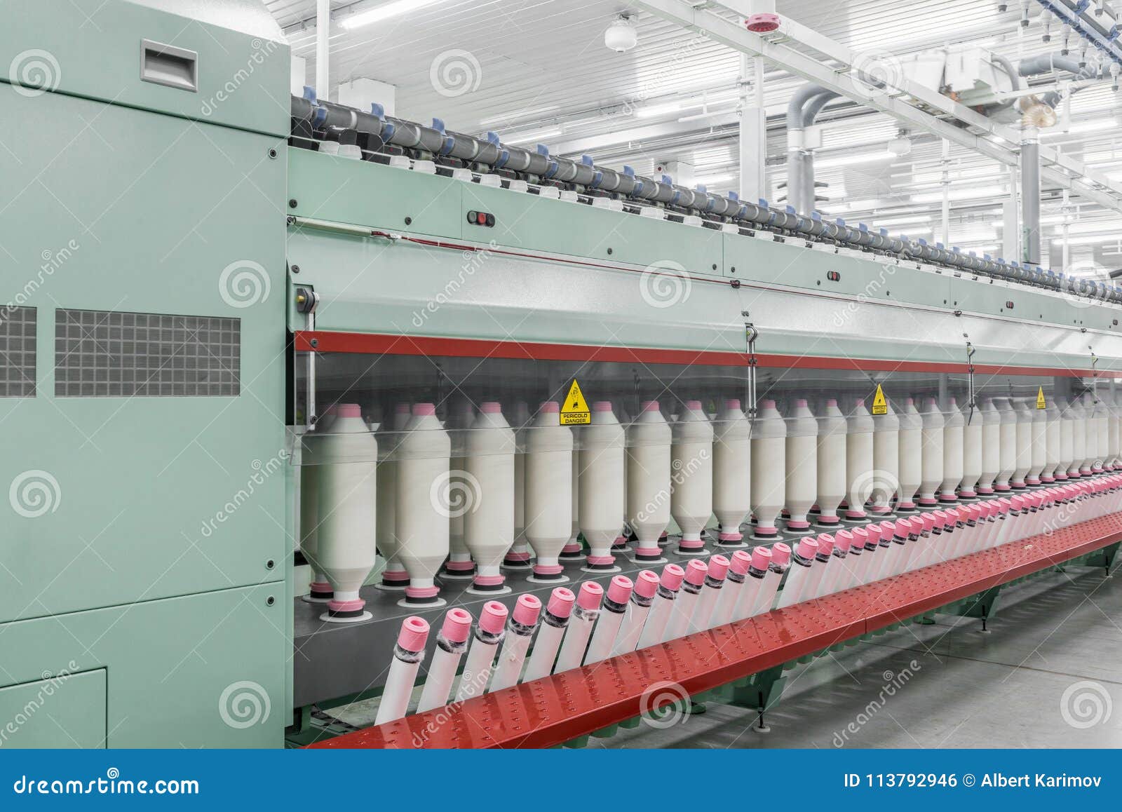 Spools of Thread at a Textile Factory Stock Photo - Image of long ...