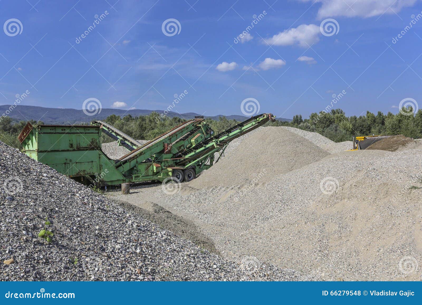 Machinery in the Pebble Exploitation Quarry Stock Photo - Image of ...