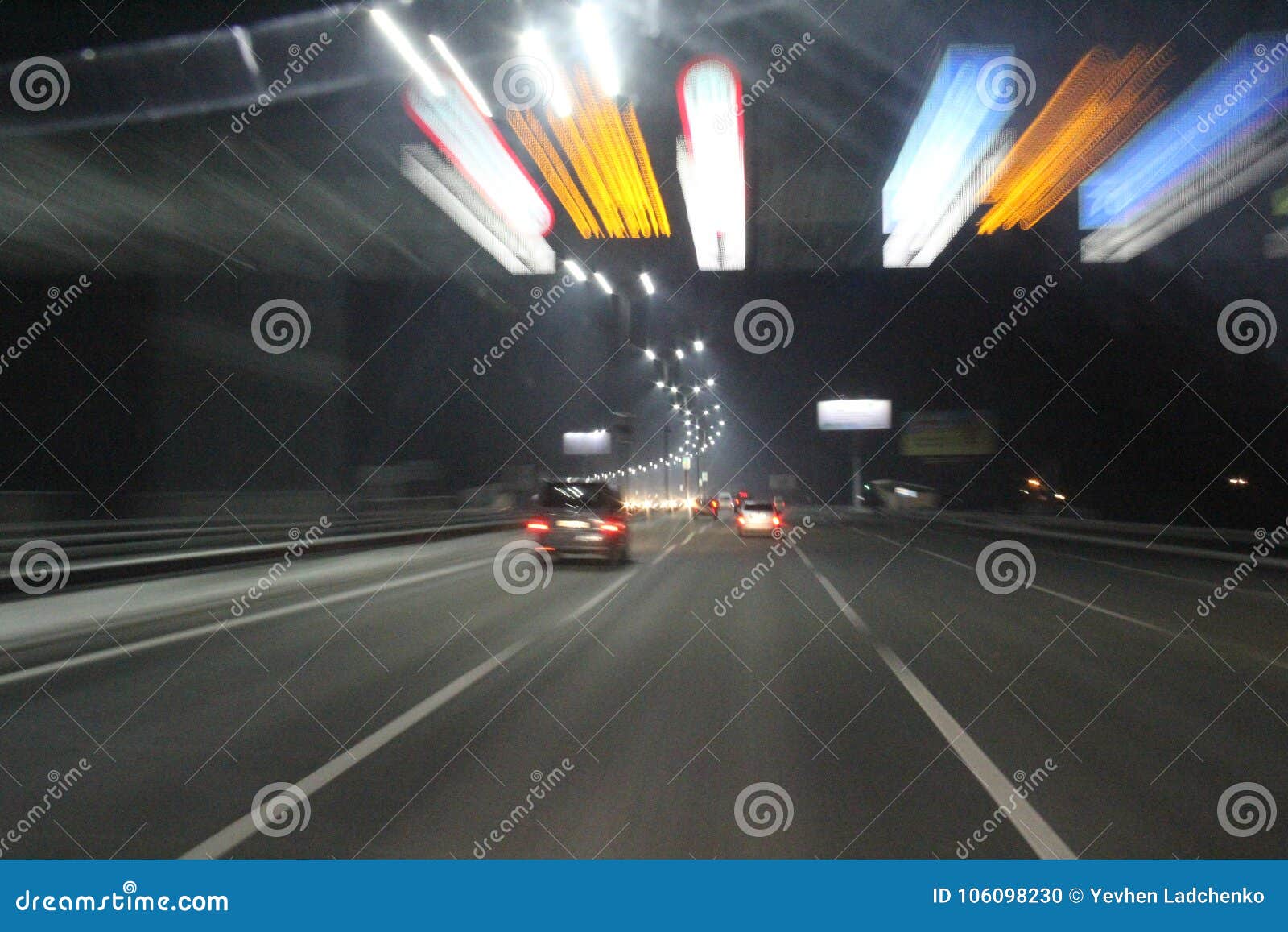 Machines Going on a Speed Route Stock Photo - Image of night, light ...