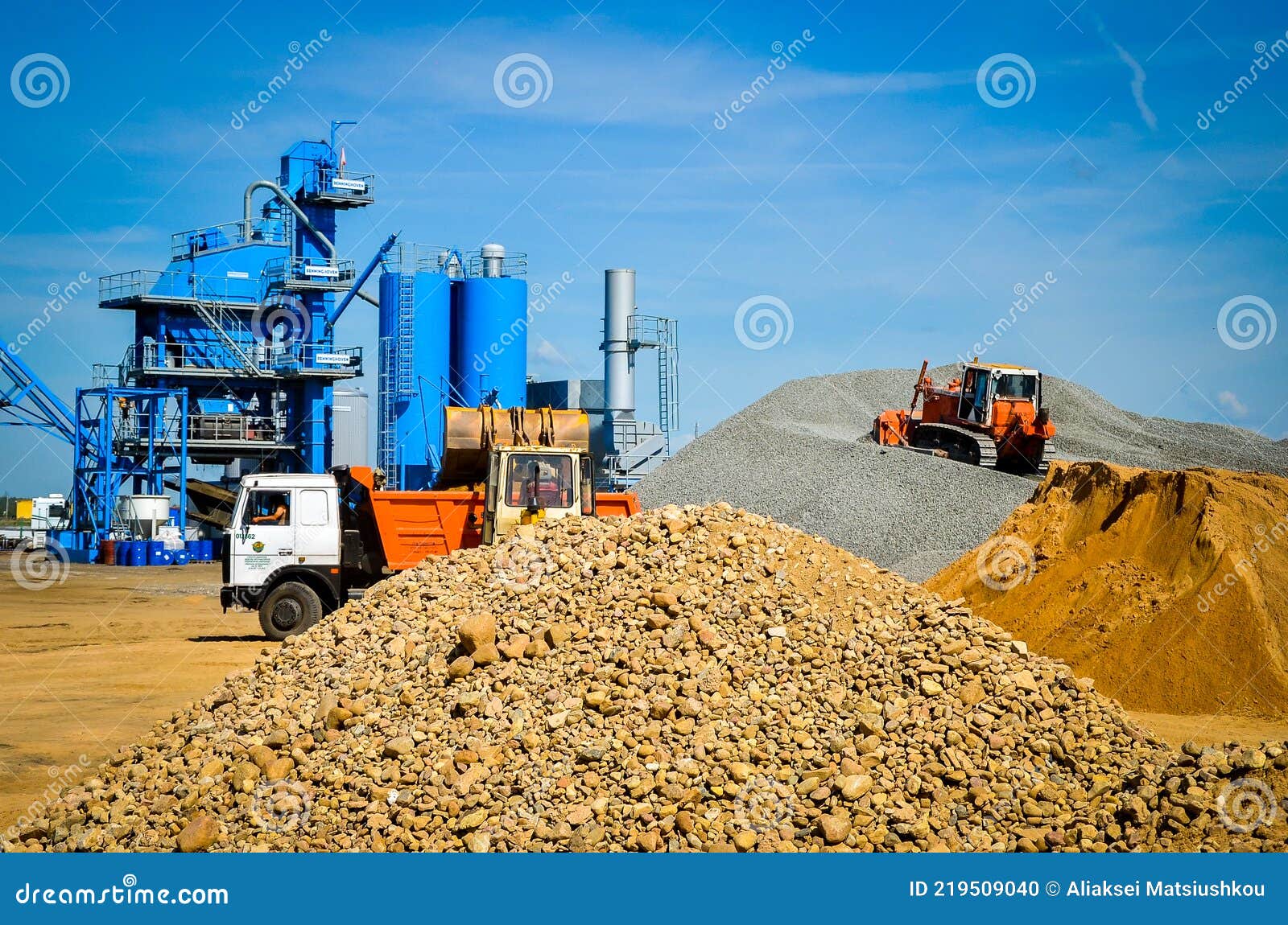 Machines Work on Loading and Unloading Material for the Production of ...
