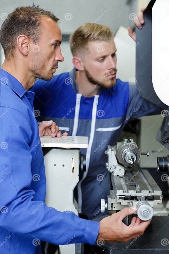 Machinist Looking at Broken Machine Stock Image - Image of lathe ...