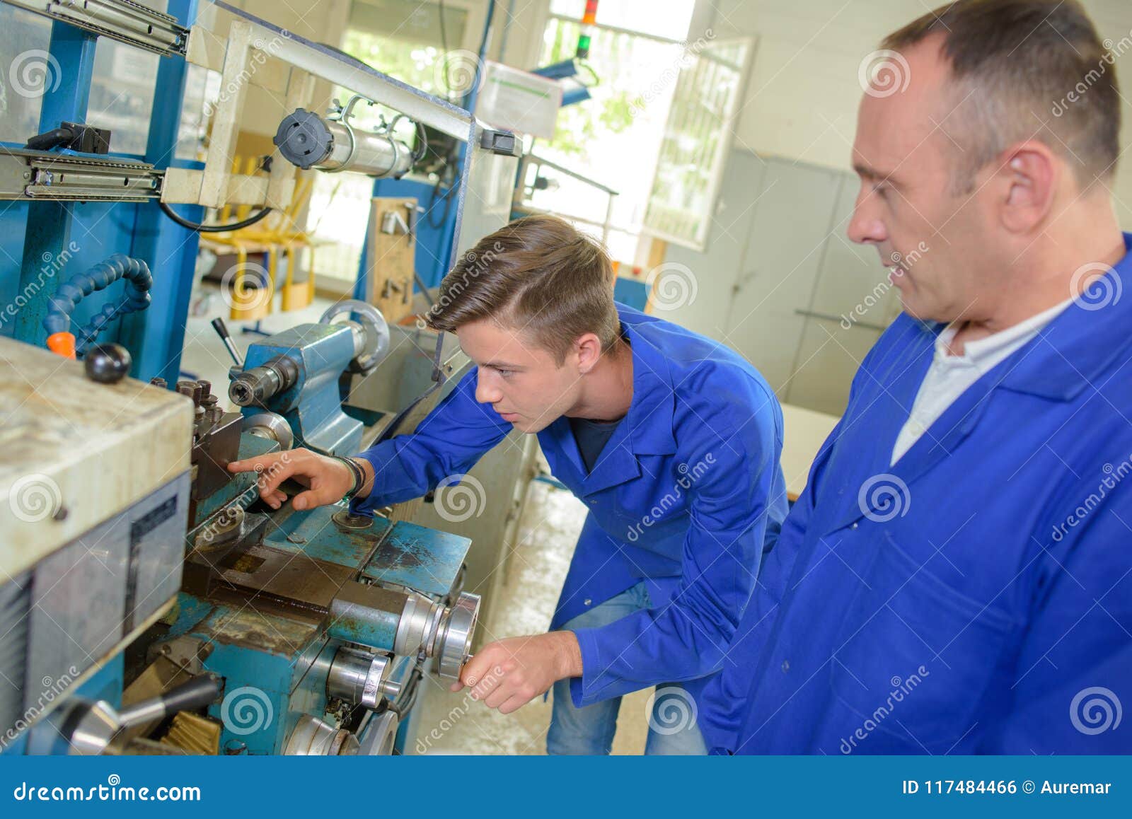 Machinist Studying a Machine Stock Photo - Image of lathes, modify ...