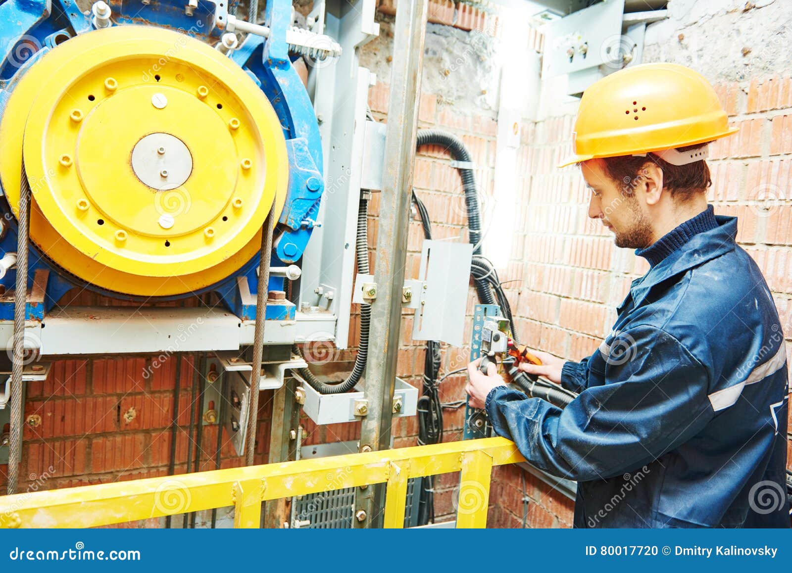 Machinist Worker Adjusting Elevator Mechanism of Lift Stock Photo ...