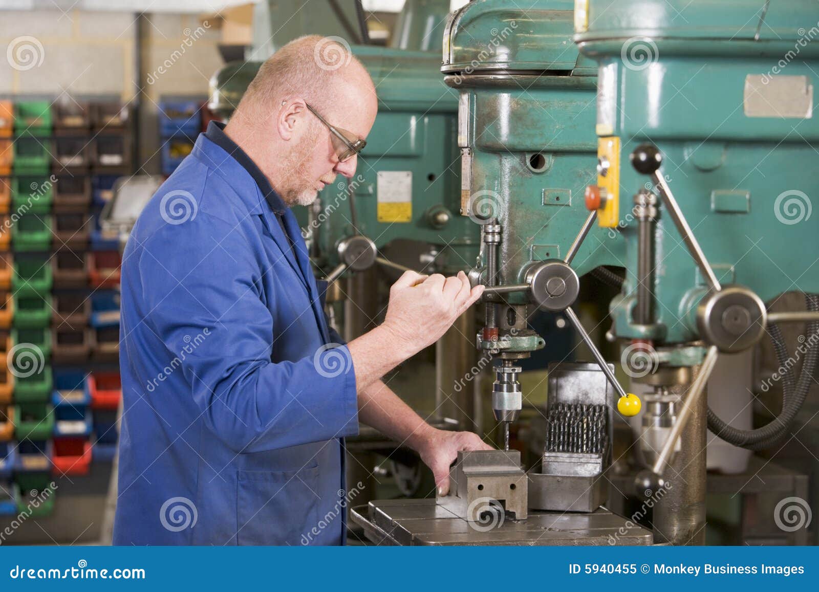 Machinist Working on Machine Stock Image - Image of engineer, mature ...