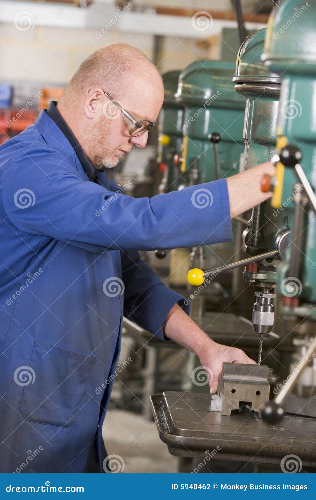 Machinist Working On Machine Royalty-Free Stock Photo | CartoonDealer ...