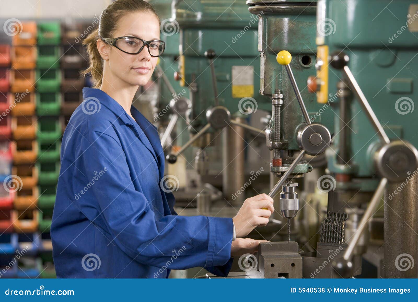 Machinist Working on Machine Stock Photo - Image of indoors ...