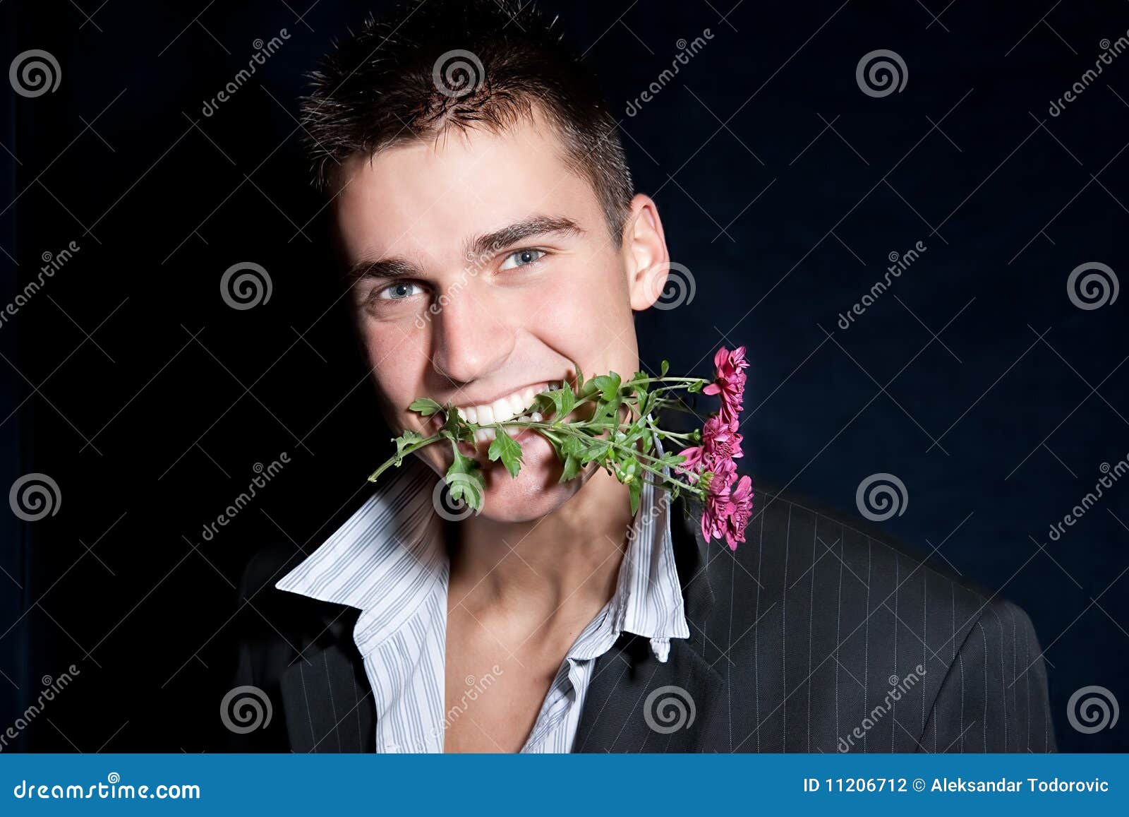 Macho Man is Holding in Mouth a Flower Stock Photo - Image of pretty ...