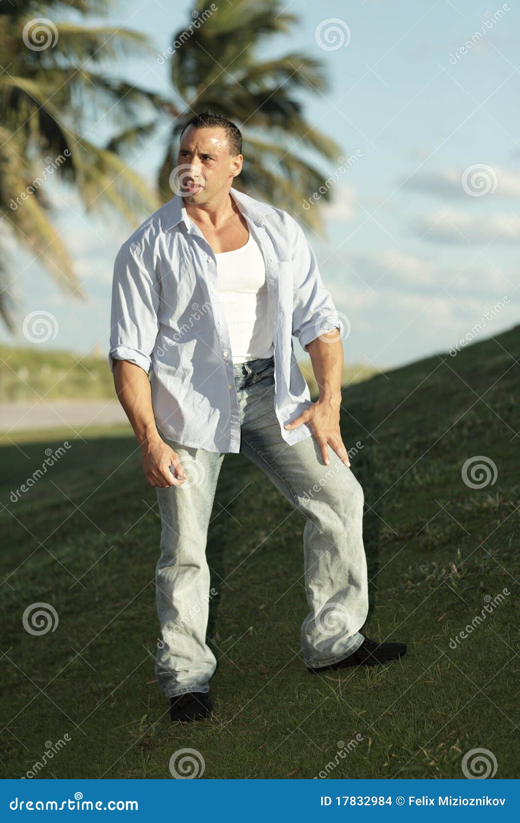Macho man in the park stock photo. Image of adult, fashionable - 17832984