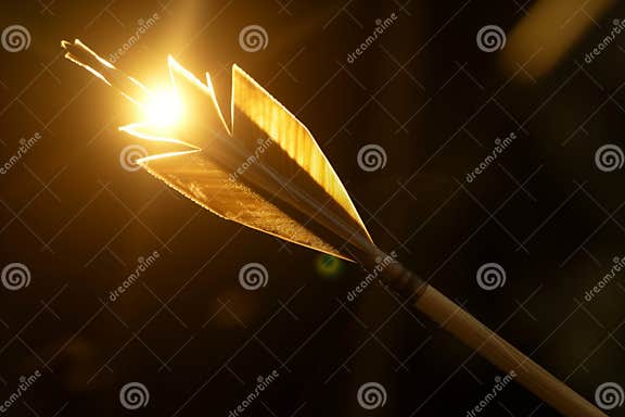 Macro of an Arrows Tip Lit by Sunlight, with a Vague Target Stock Image ...