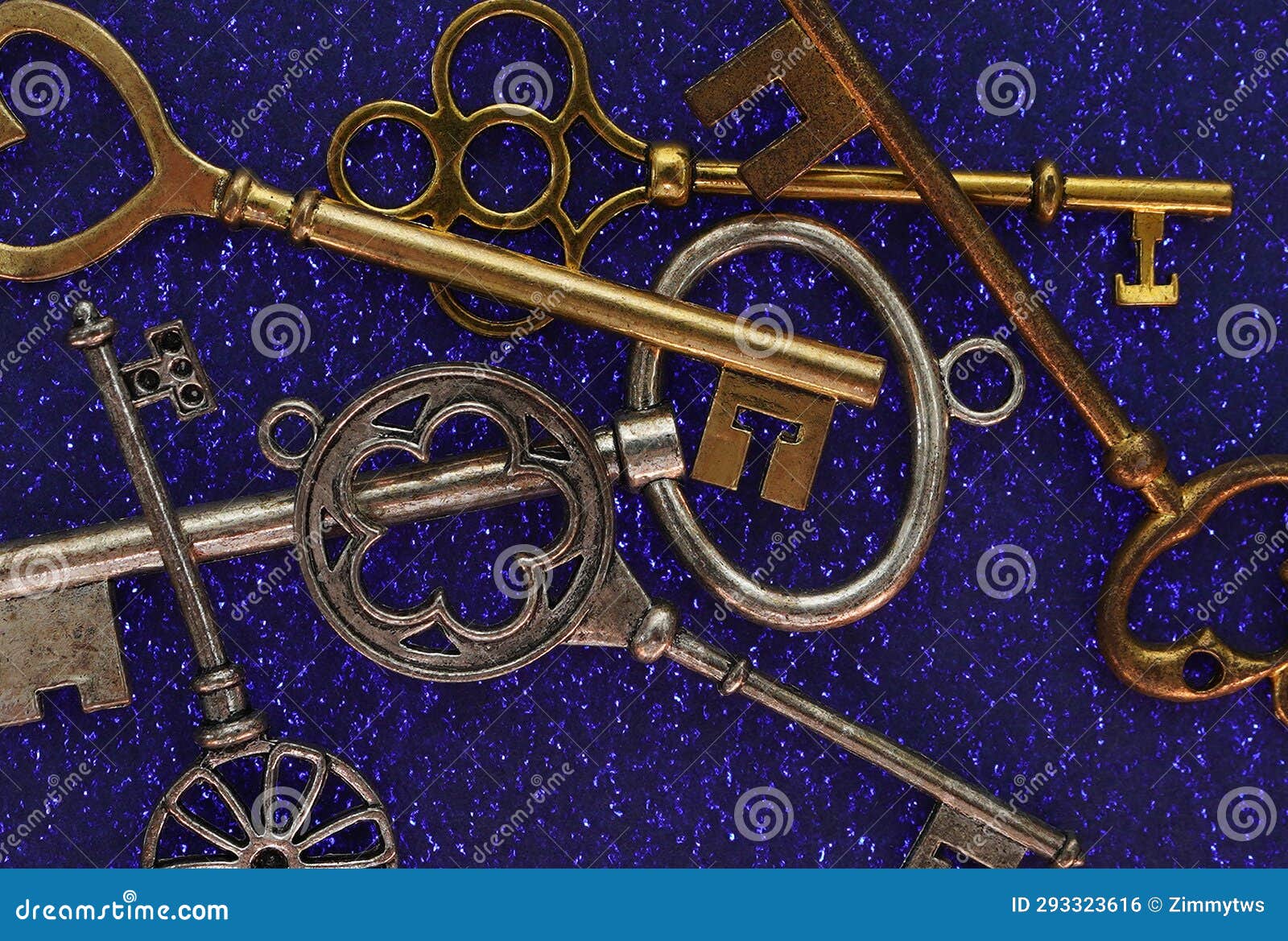 Macro of Assorted Vintage Gold and Silver Keys on Blue Background Stock ...