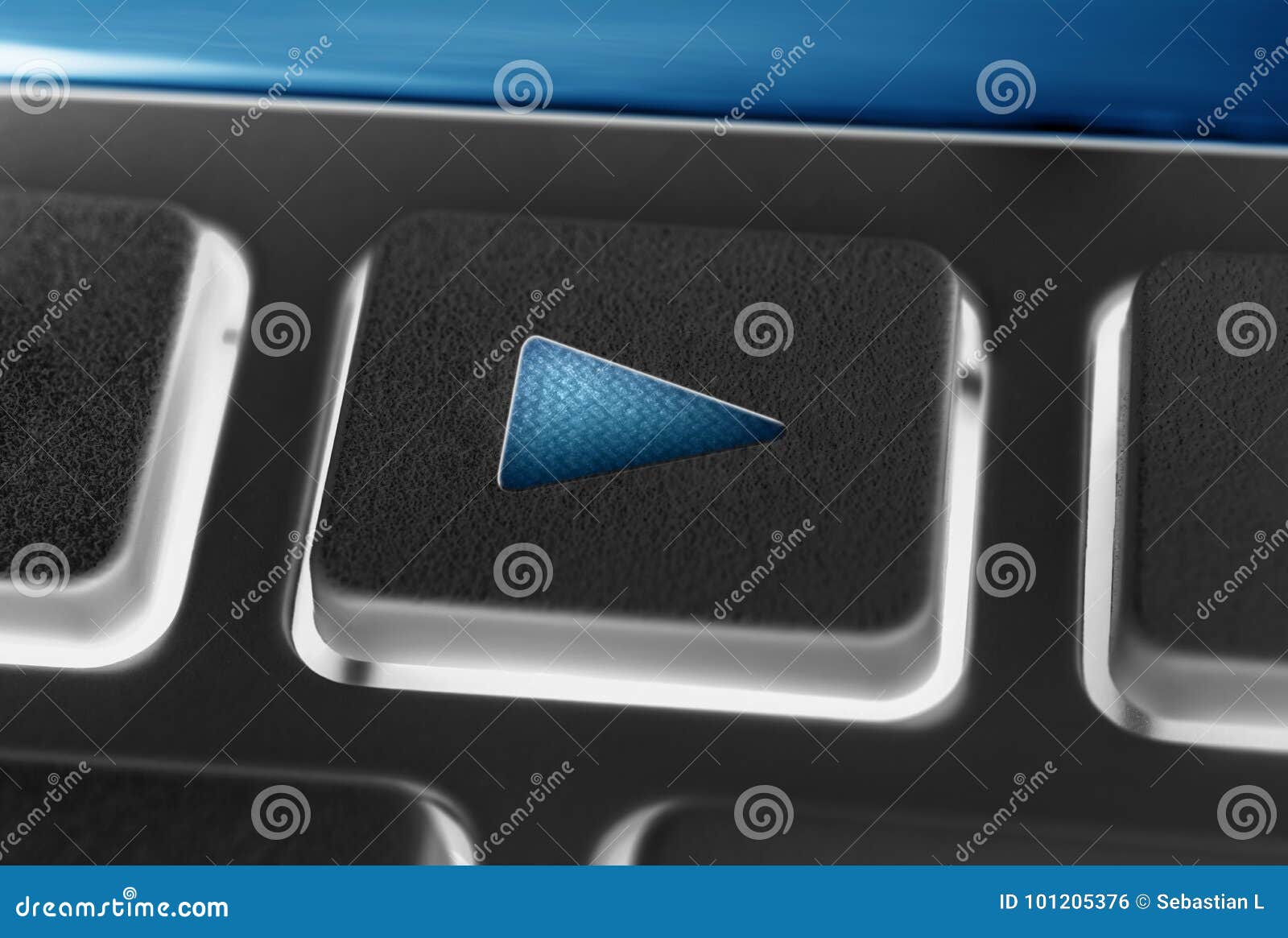 Macro of a Black Play Button of a Black Remote Control with Backlight ...