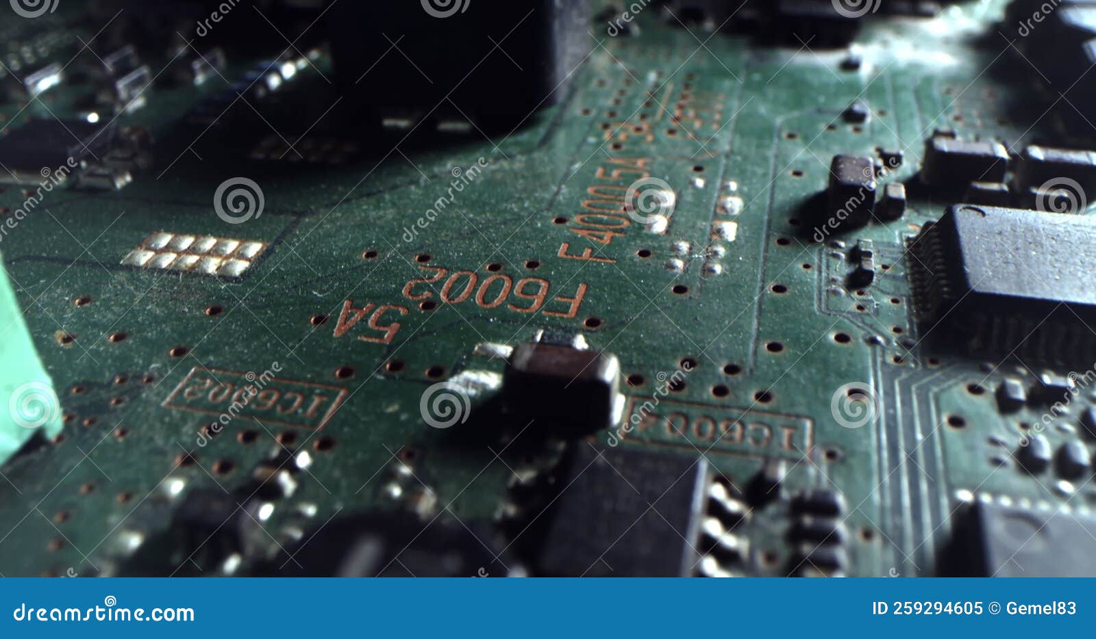 Macro Camera Moving Slowly Over Printed Circuit Board, Showing Computer Motherboard Components ...