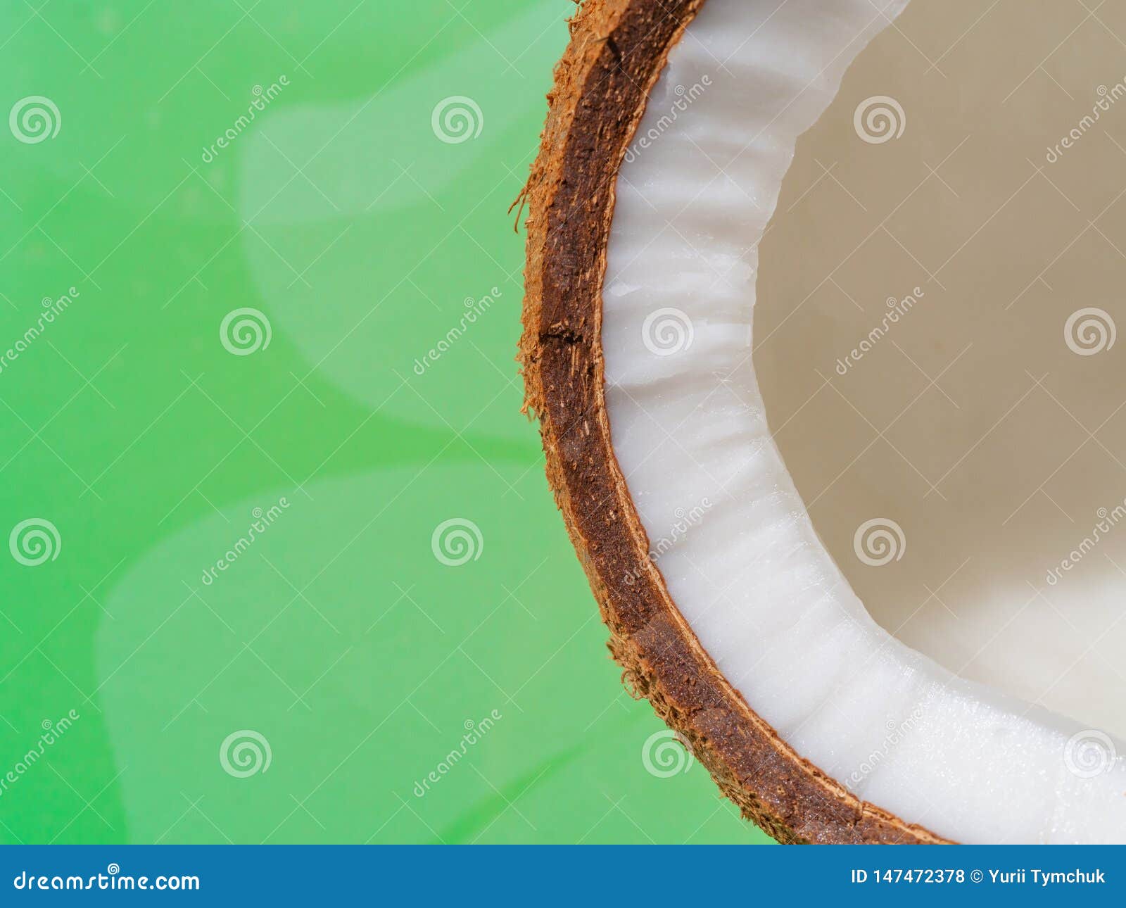 Macro of Coconut Half on Green Background, Copy Space Stock Photo ...