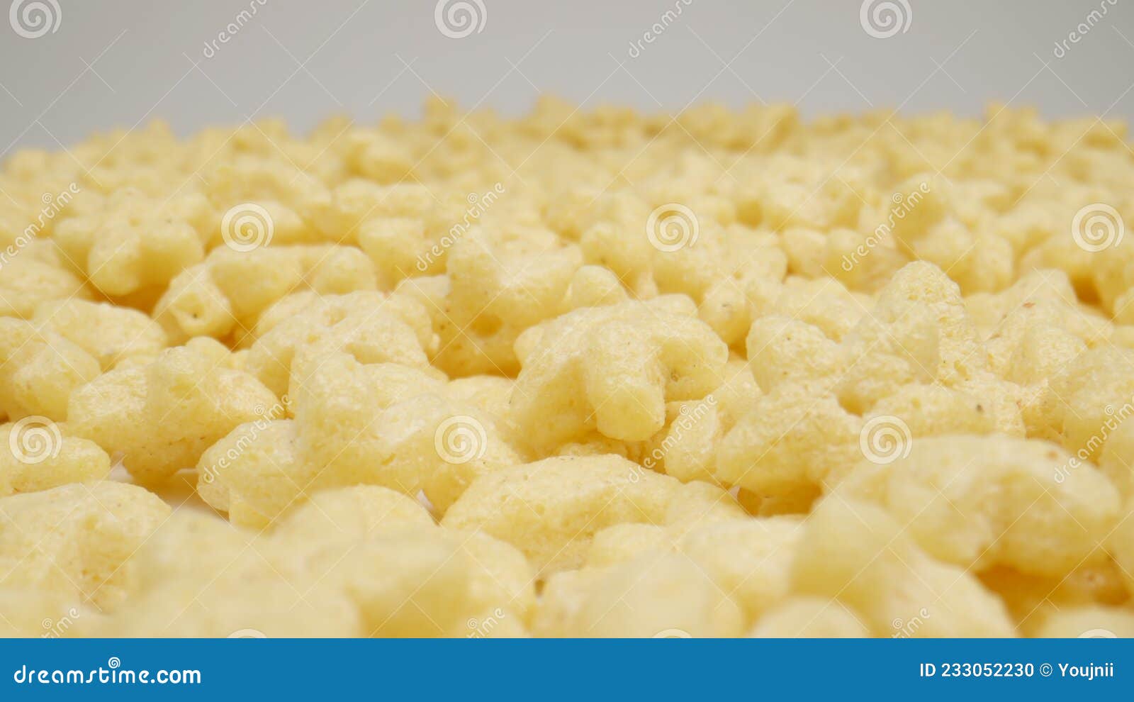 MACRO: Corn Flakes Star Figure on a White Background Stock Photo ...