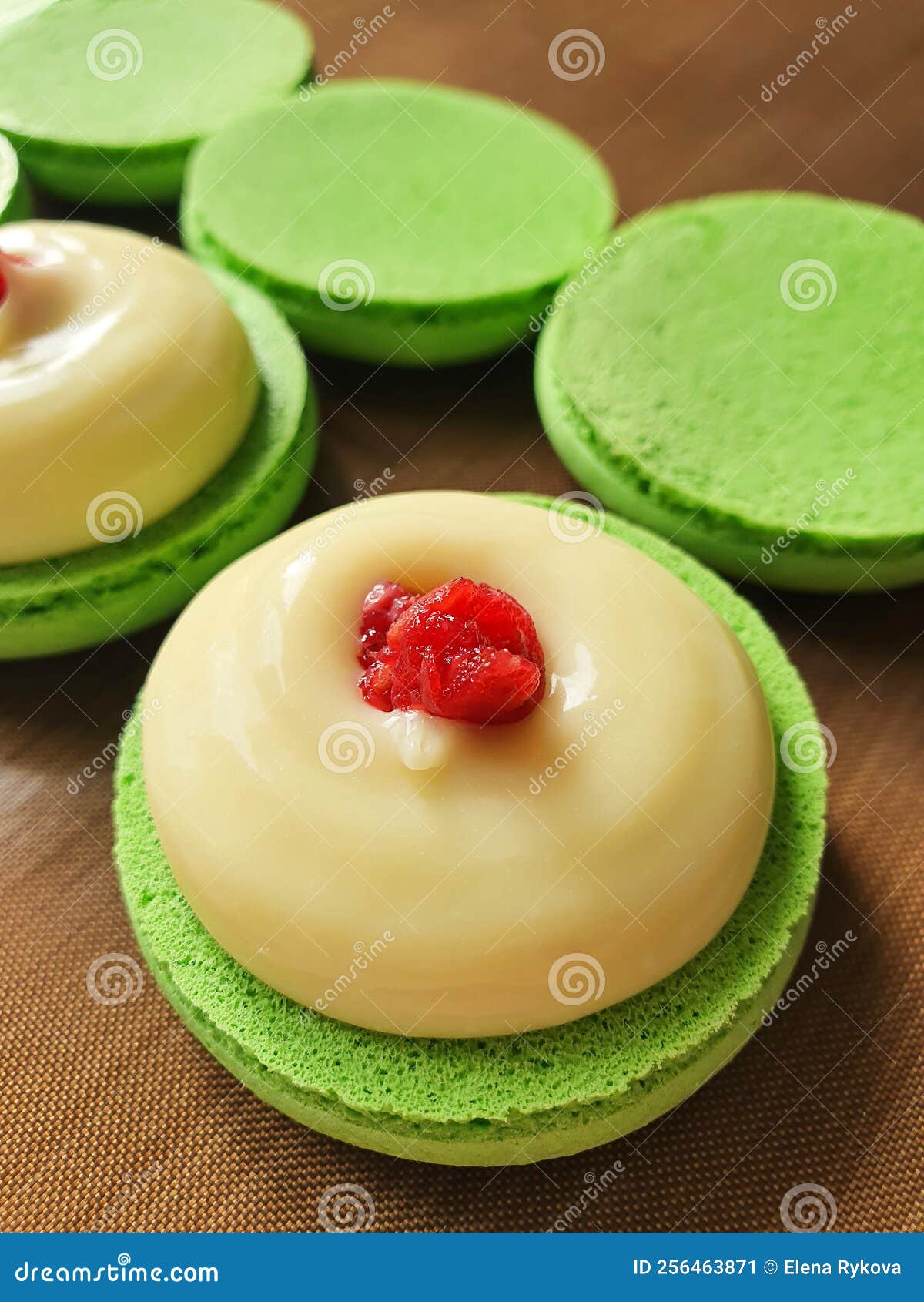 Macro Filling with Ganache and Raspberry on Green Macarons Stock Image ...