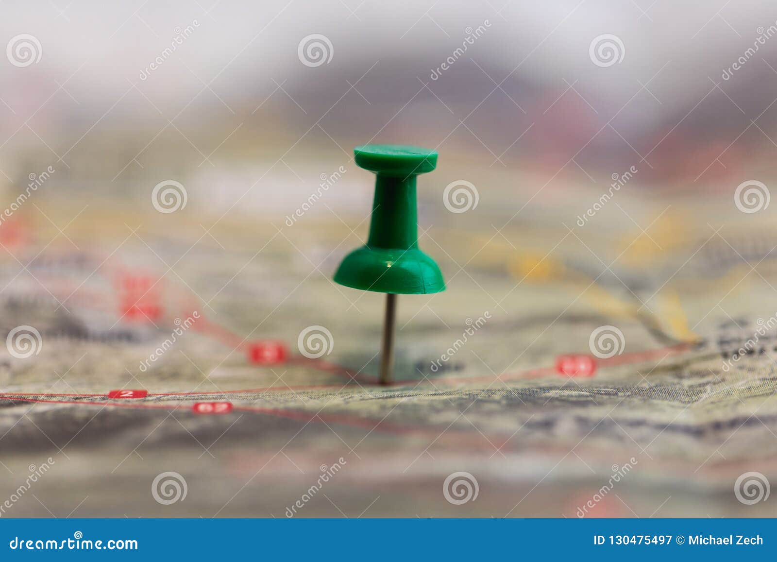 Macro of Green Pin Marks a Location of a Destination on a Map Stock ...