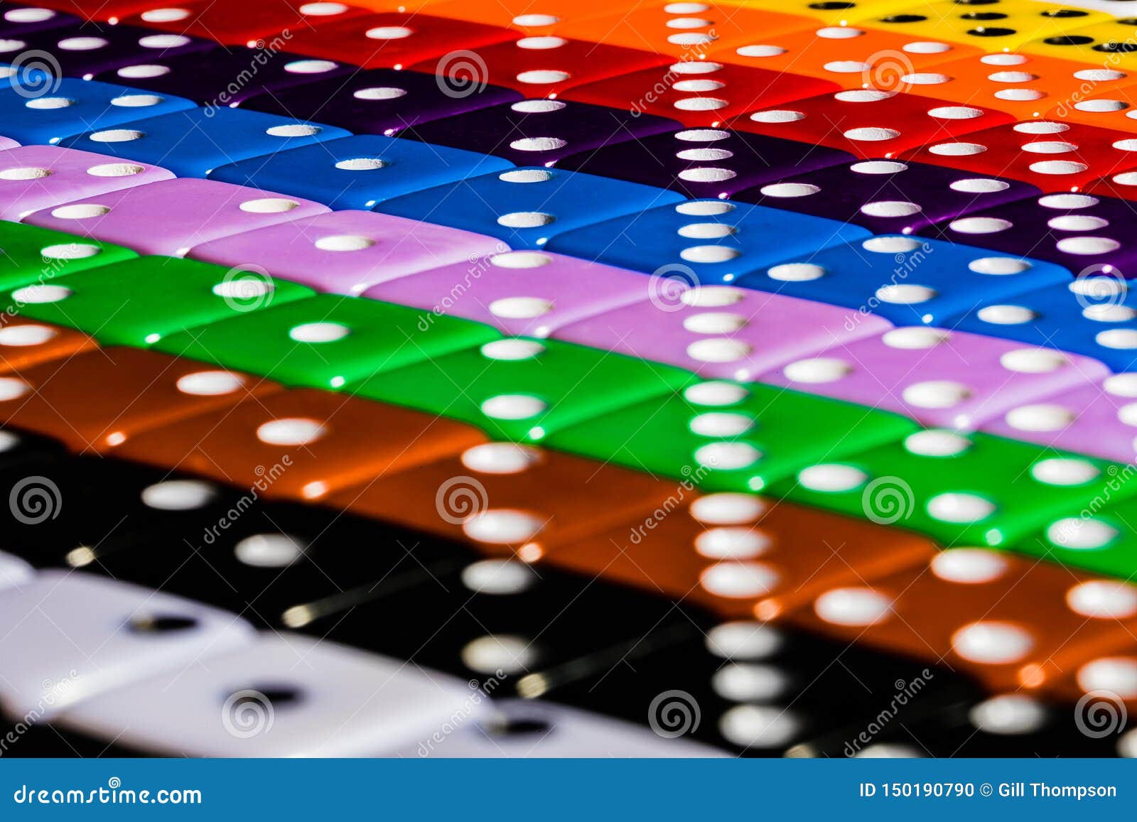 A Macro Image of Diagonal Rows of Multicolored Dice, Lined in OCD ...