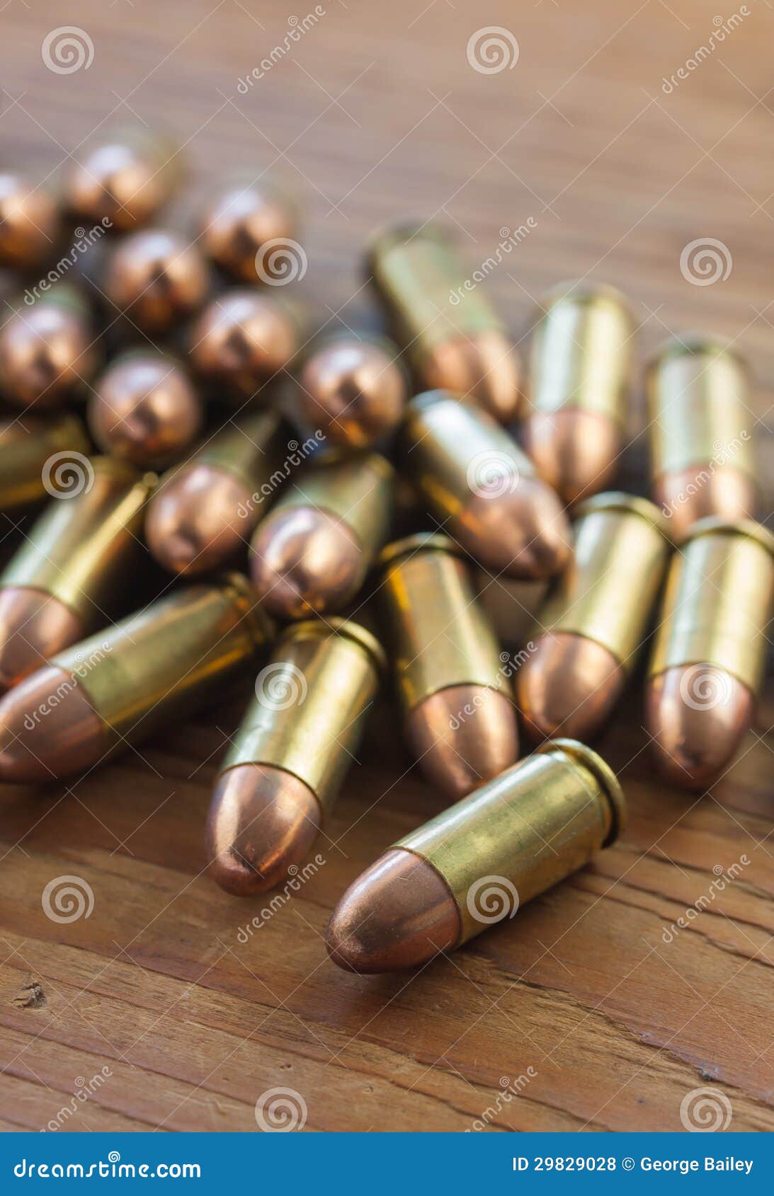 Bullets on wood stock photo. Image of wood, vertical - 29829028