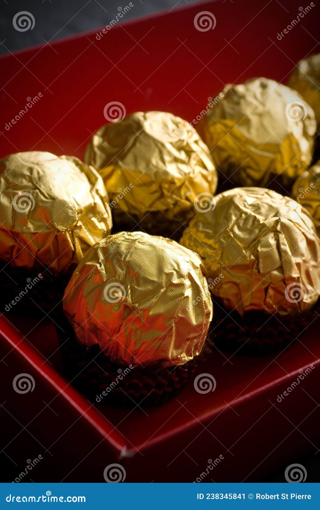 Macro Image of Red Box with Chocolate in Gold Wrapping Stock Image ...