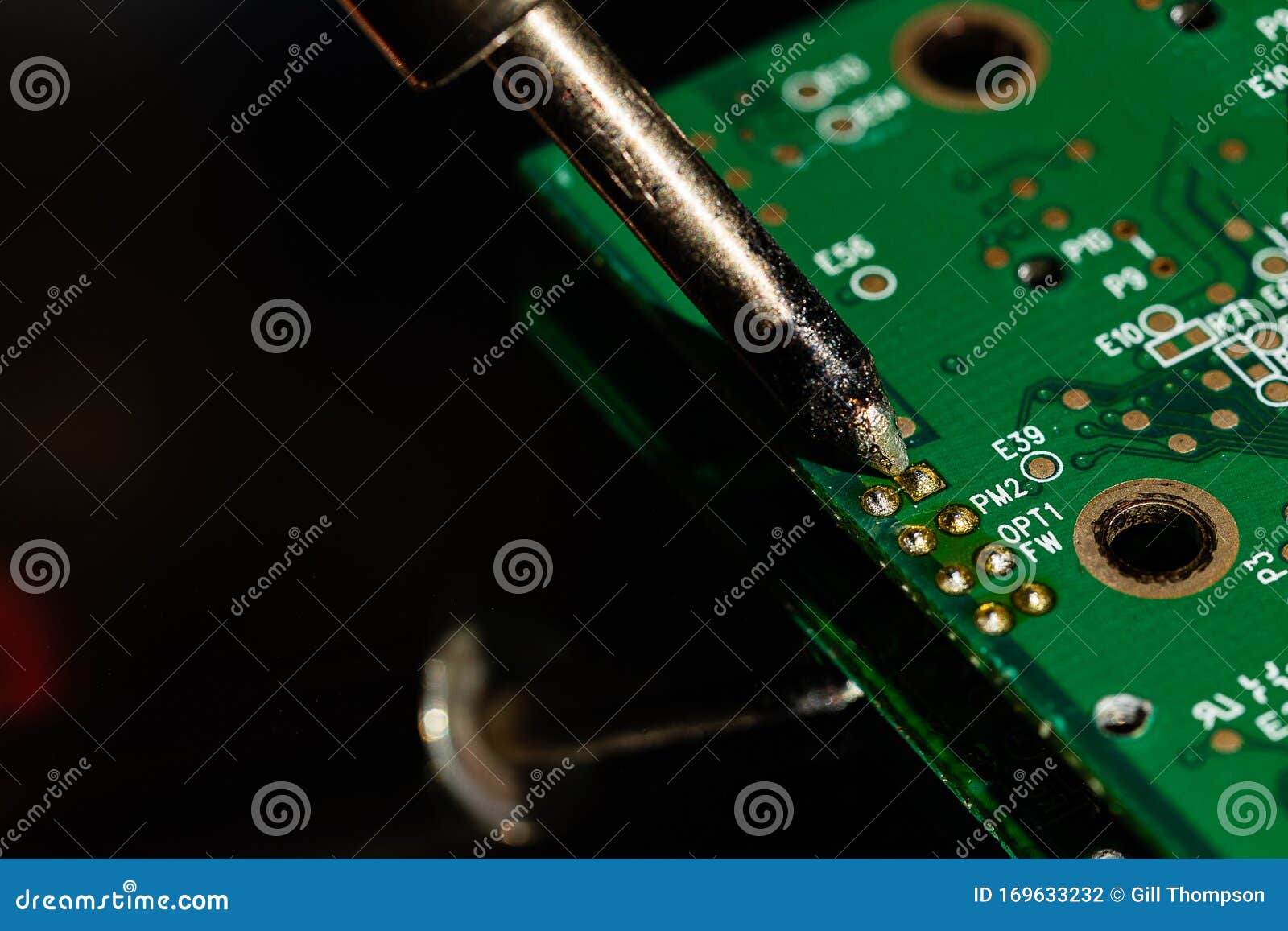 Macro Image of a Soldering Iron Tip Being Applied To a Component ...