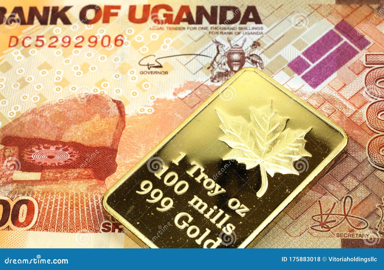 A Thousand Shilling Note from Uganda with a Gold Bar in Macro Stock ...