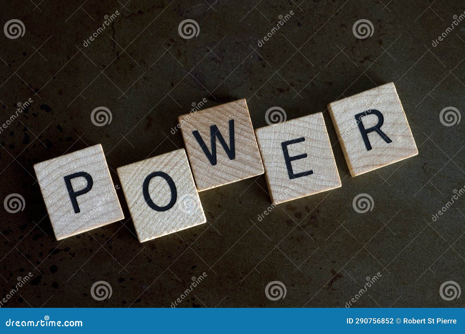 Macro Image of the Word Power in Wooden Blocks on Metal Background ...