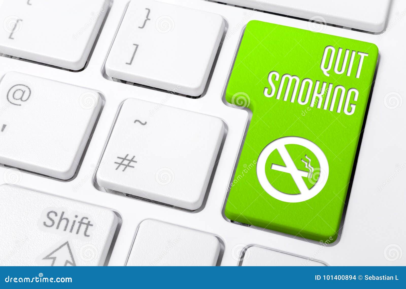 Macro of a Keyboard with the Green Button Quit Smoking and a Smoking ...