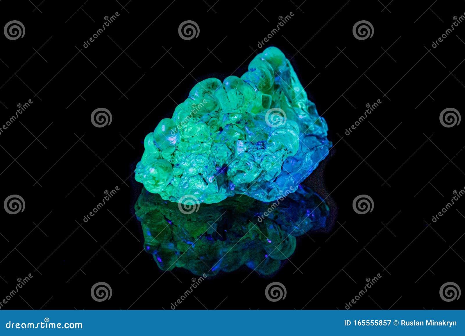 Macro Mineral Stone Opal Under Ultraviolet Light on a Black Background ...