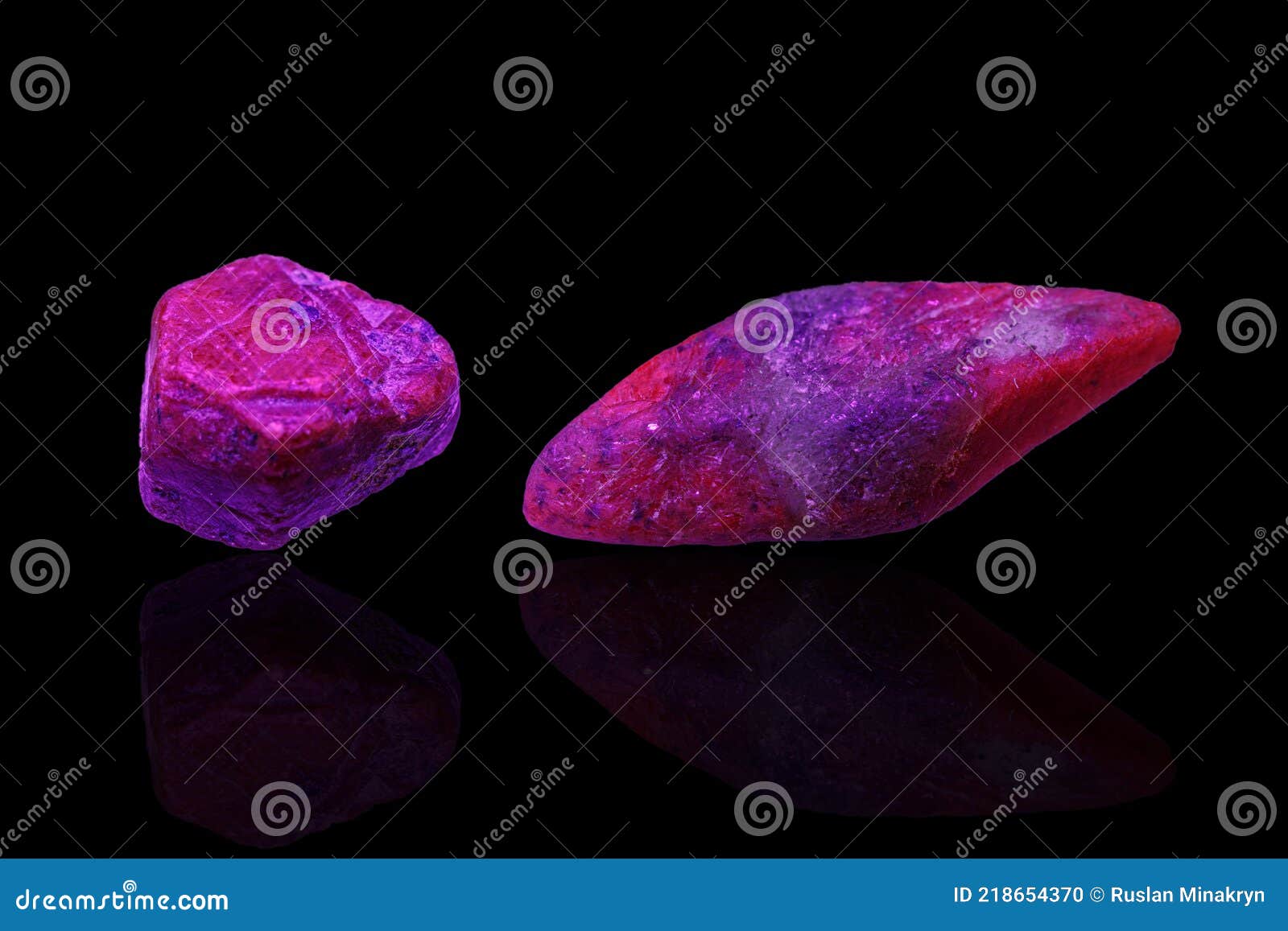 Macro Mineral Stone Ruby Under Ultraviolet Light on a Black Background ...