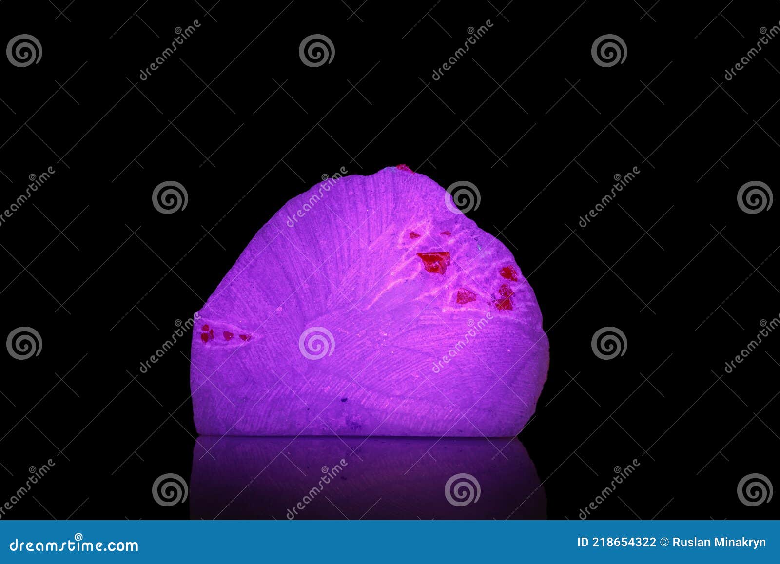 Macro Mineral Stone Spinel Under Ultraviolet Light on a Black ...