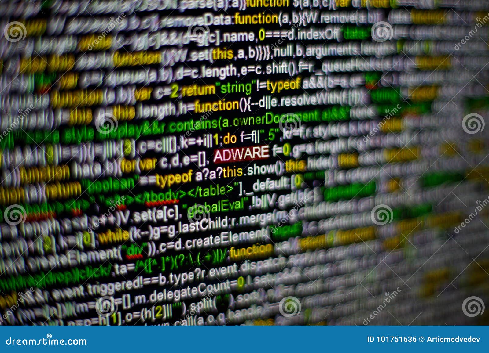 Macro Photo Of Computer Screen With Program Source Code And Highlighted Adware Inscription In