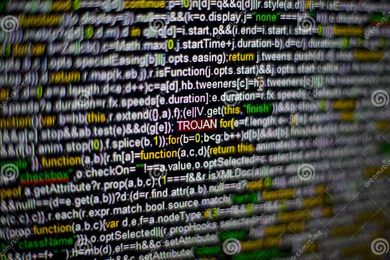 Macro Photo Of Computer Screen With Program Source Code And Highlighted Trojan Inscription In