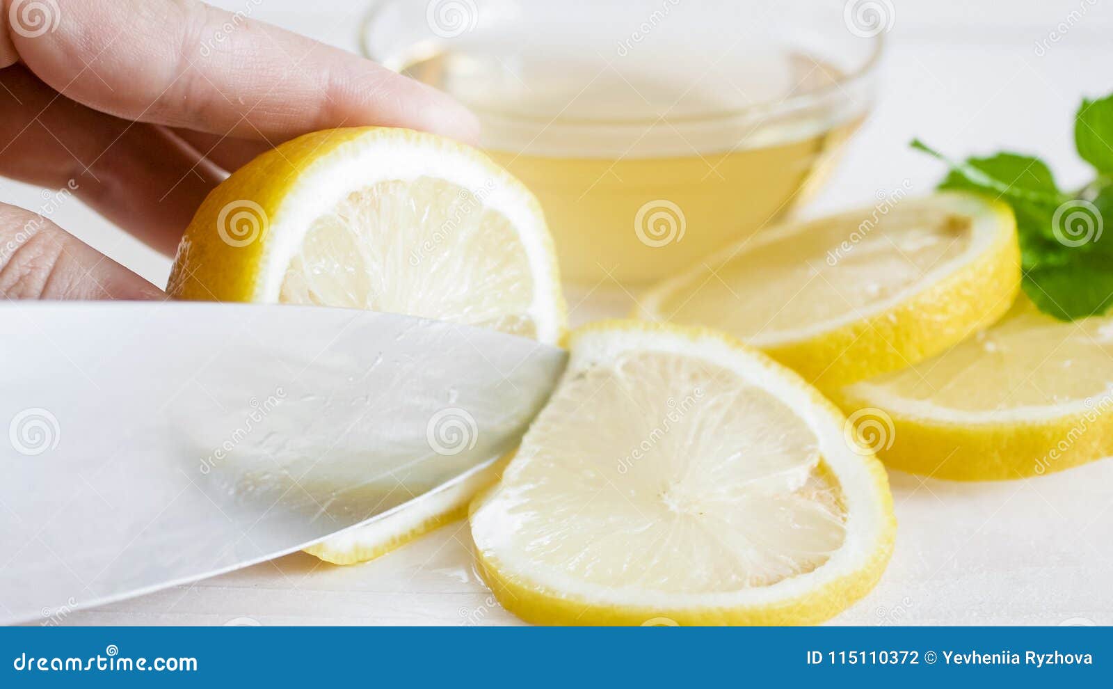 Macro Image of Fresh Lemon Being Cut with Sharp Knife Stock Photo ...