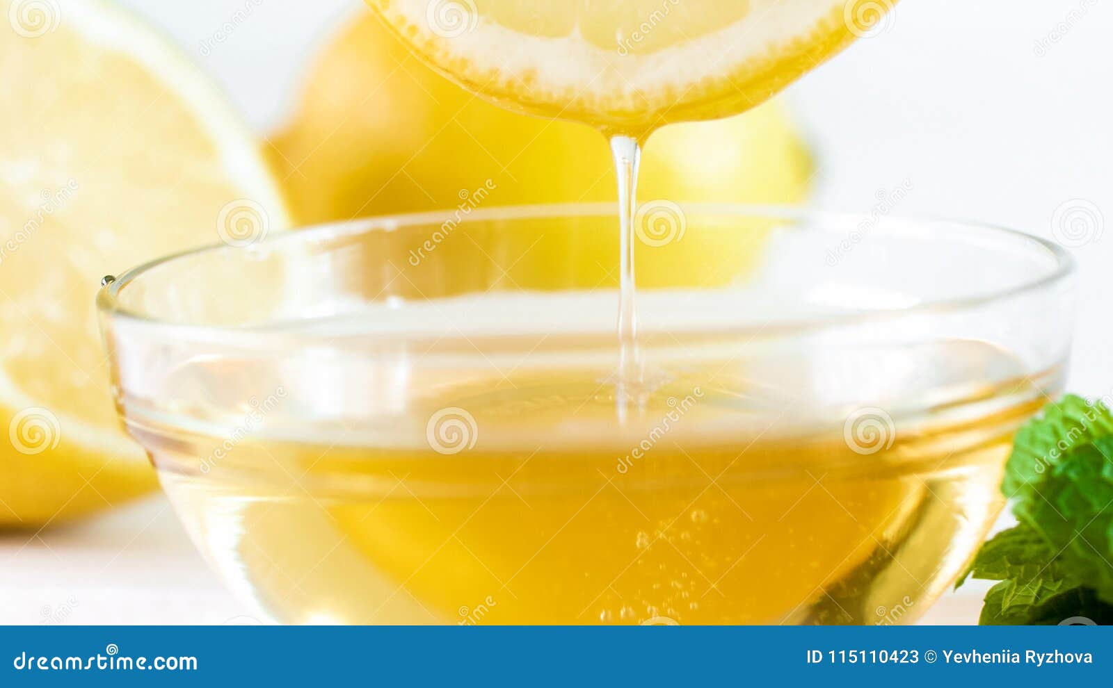 Macro Image of Natural Bee Honey Dripping from Lemon Slice Stock Image ...