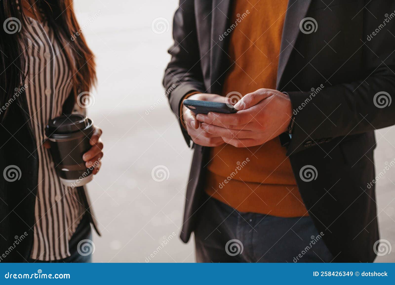 Macro Photo of Young People Using the Phone during a Break from Work ...