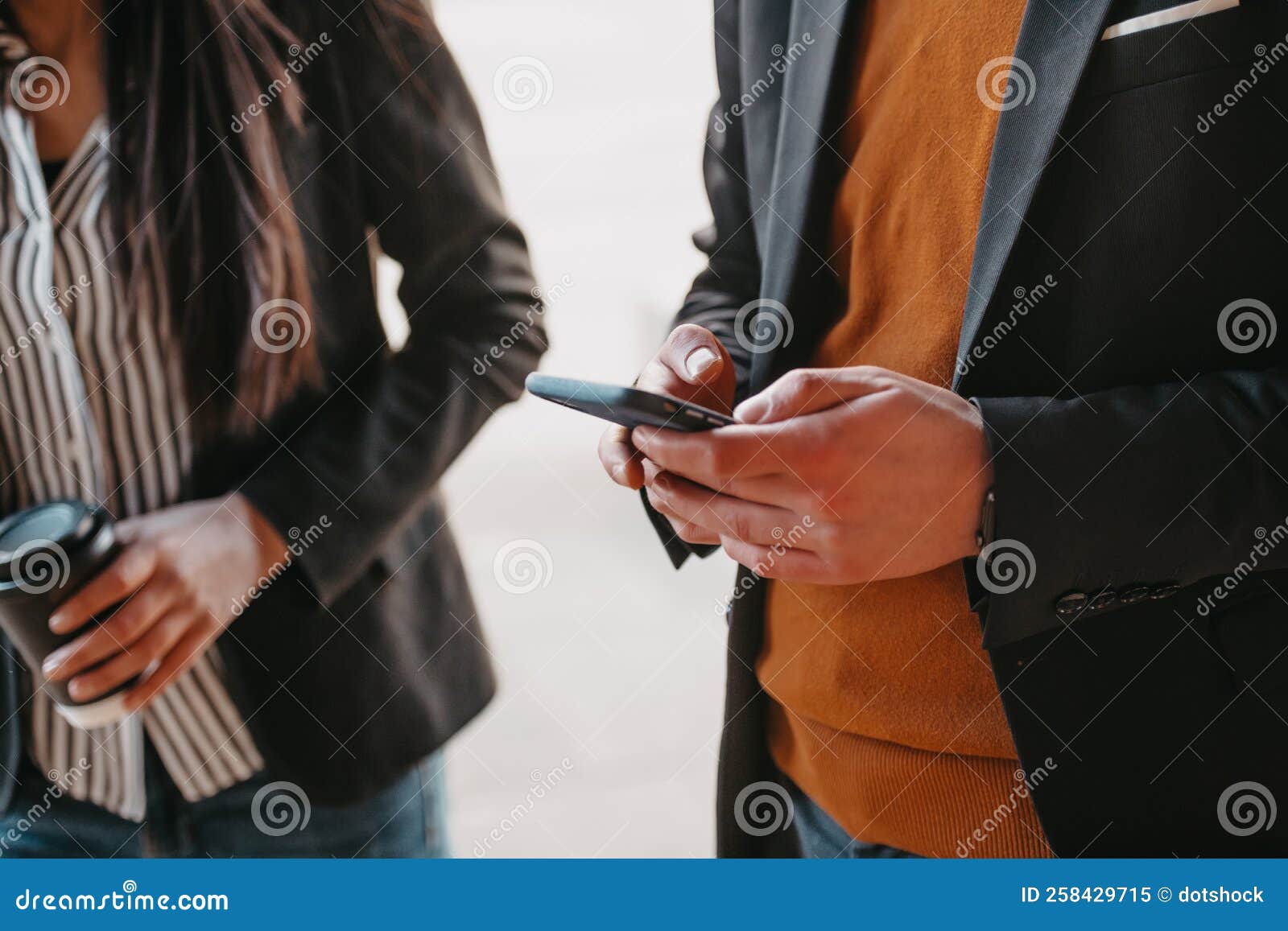 Macro Photo of Young People Using the Phone during a Break from Work ...