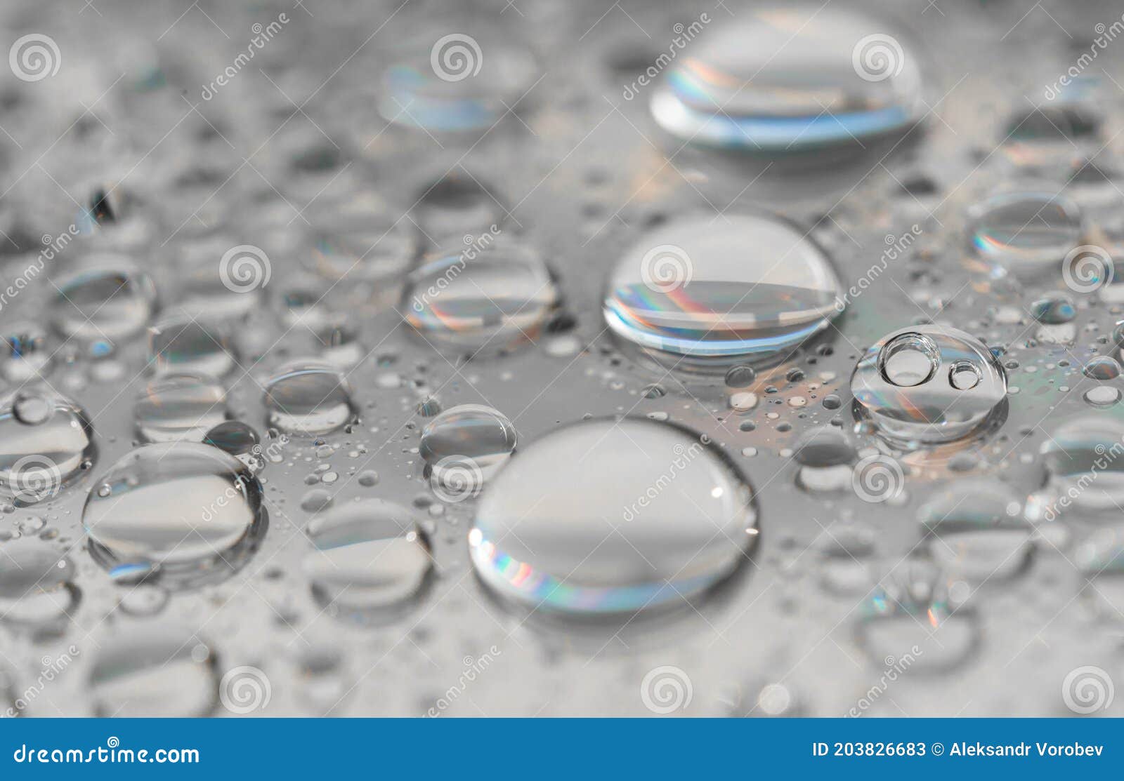 Macro Photography of Water Drops on a Mirror Reflective Surface. Stock ...
