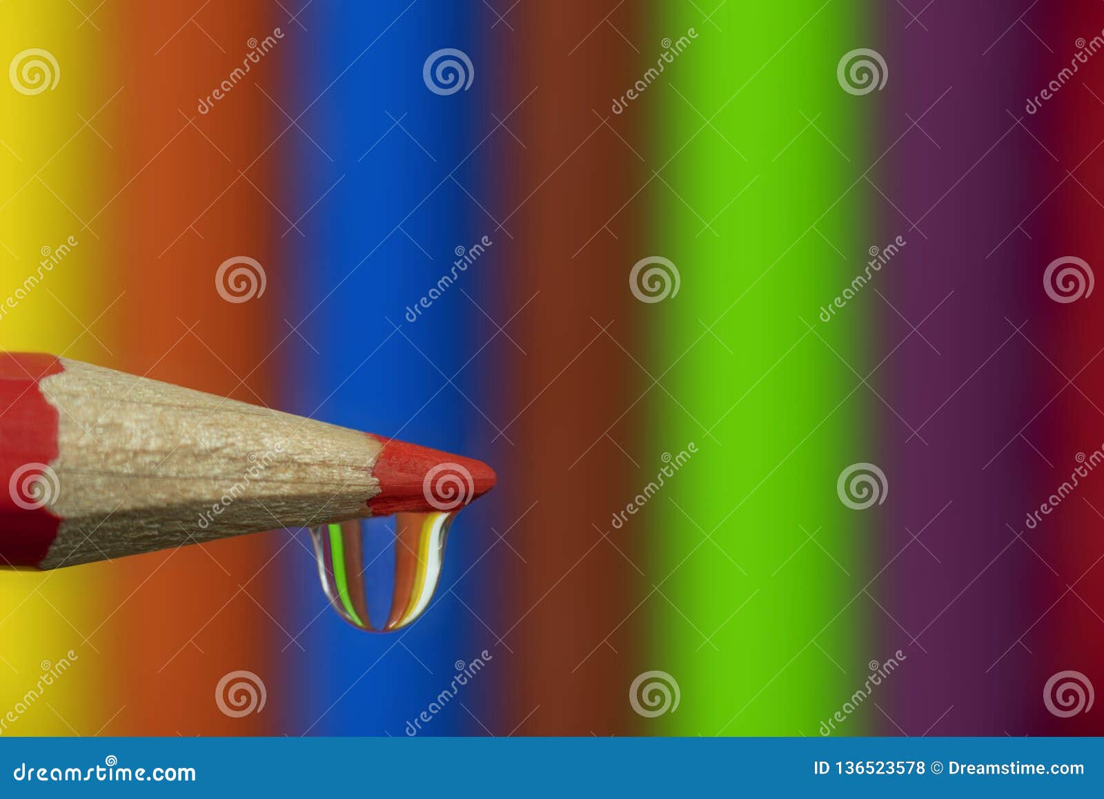 Macro of a Red Pencil Wit a Waterdrop with Rainbow Pattern. Stock Photo ...